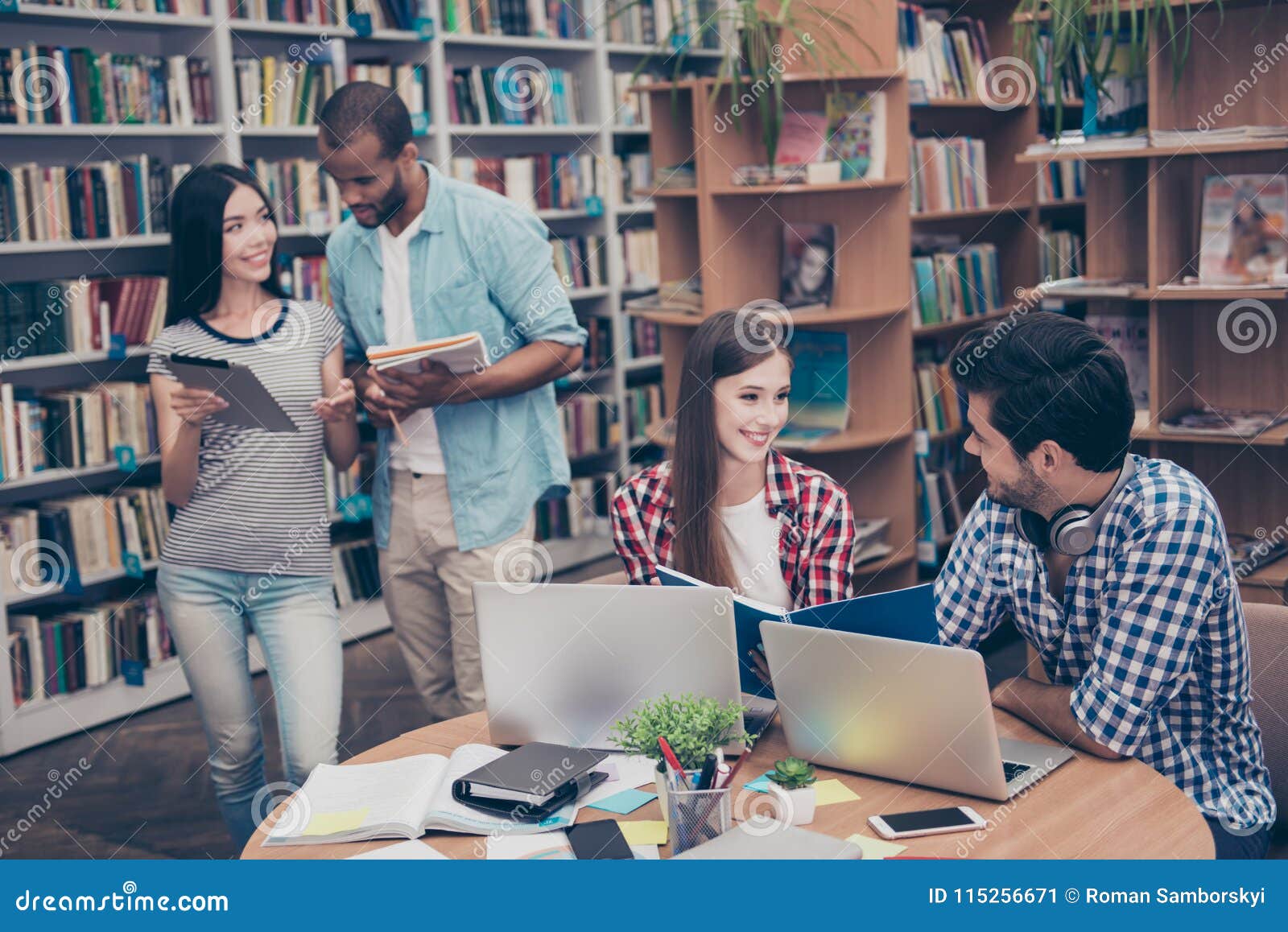 Couples of International Students are Studying after Lectures in Stock ...