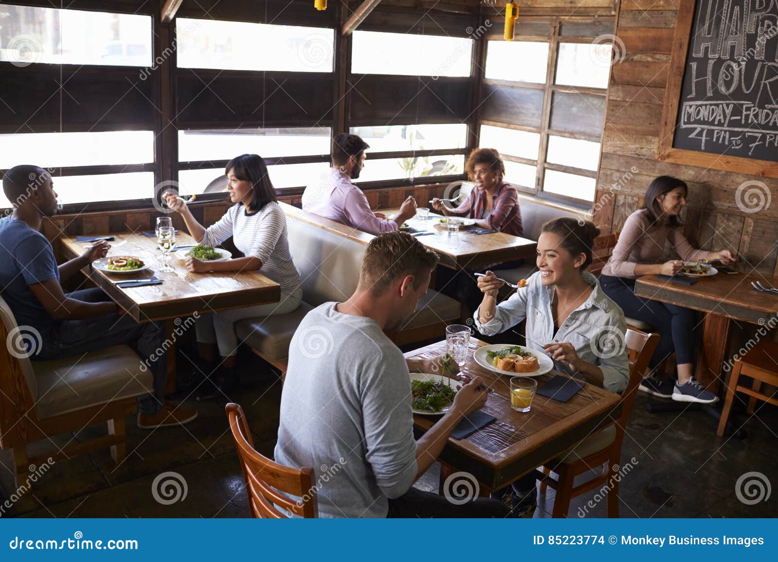 Couples Relaxing Over Lunch in a Restaurant, Elevated View Stock Photo ...