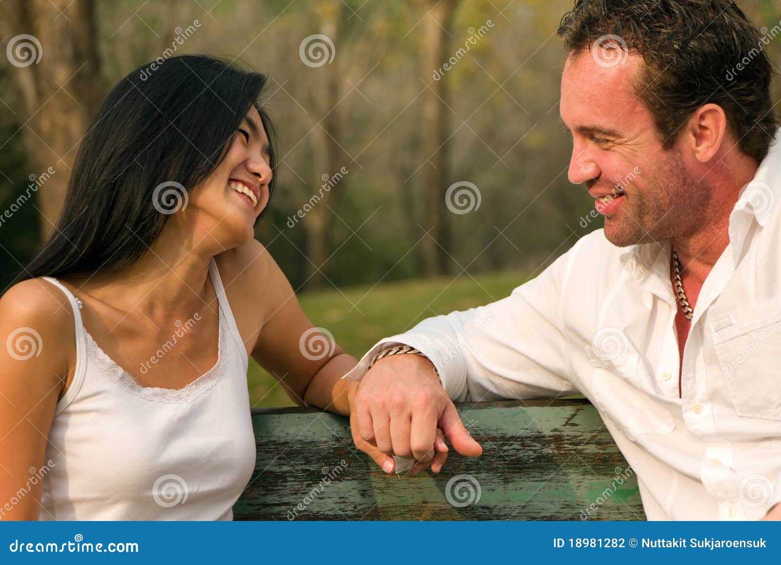 Couples Sat Hand in Hand and Smile Stock Photo - Image of life, young ...