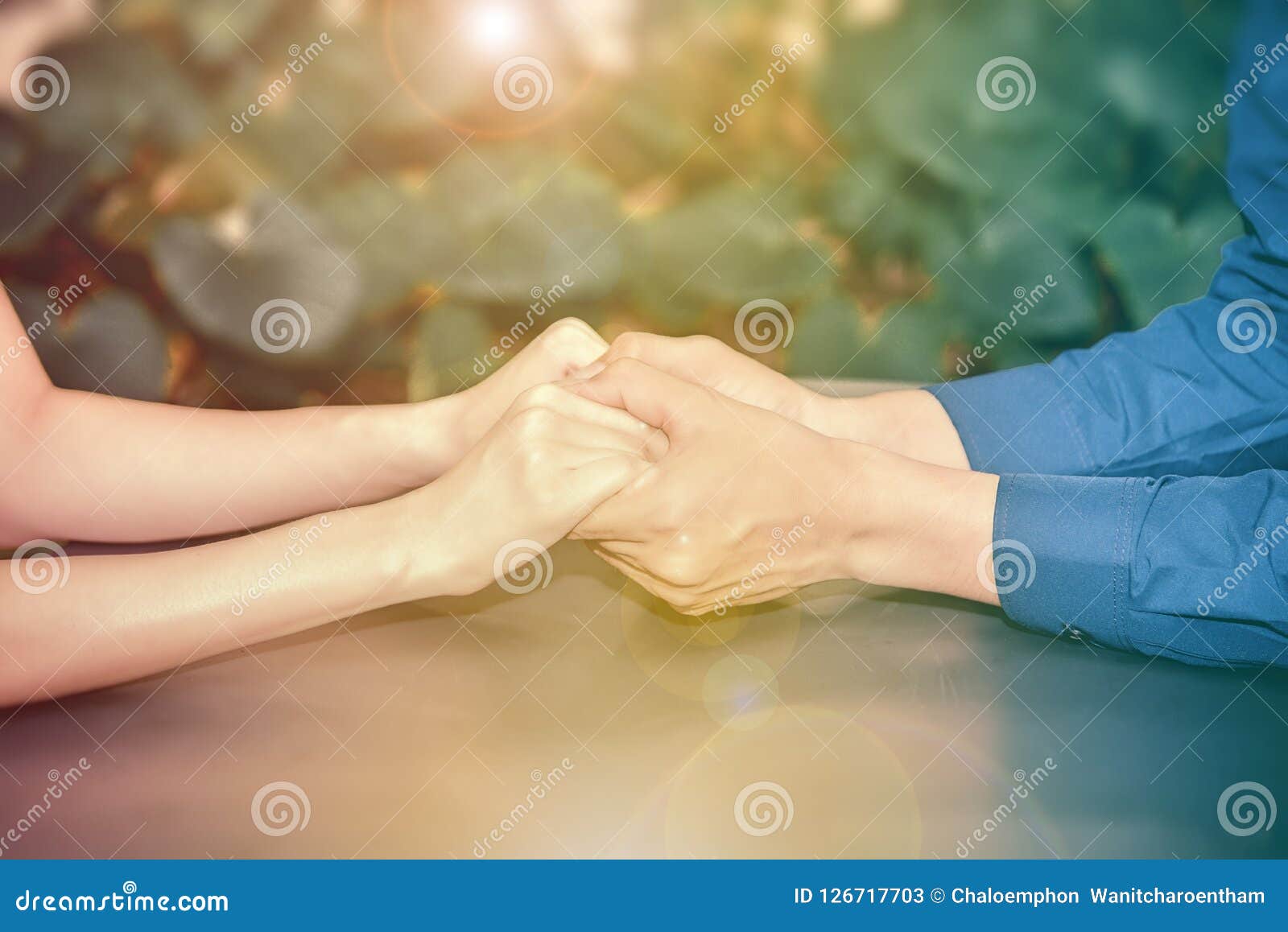 Couples are Shaking Hands in the Park with Morning Light. Stock Image ...