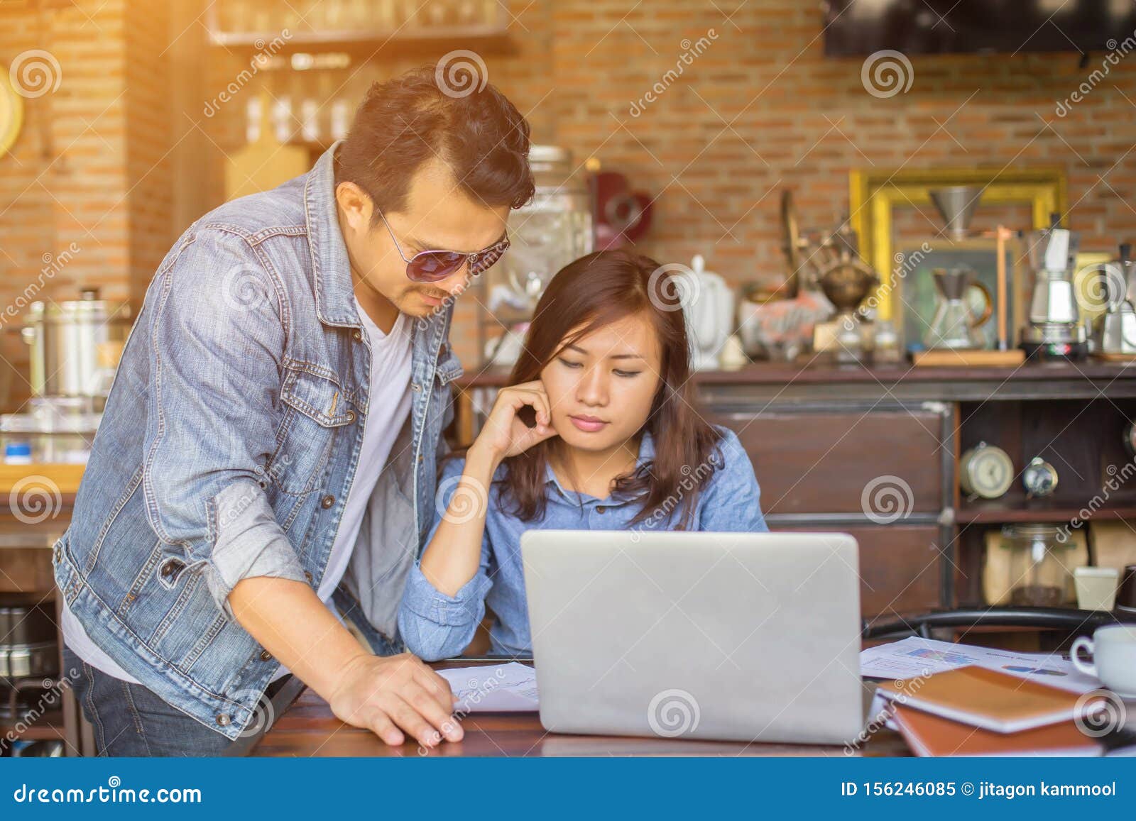 Couples Using Laptops To Work Together Stock Image - Image of ...