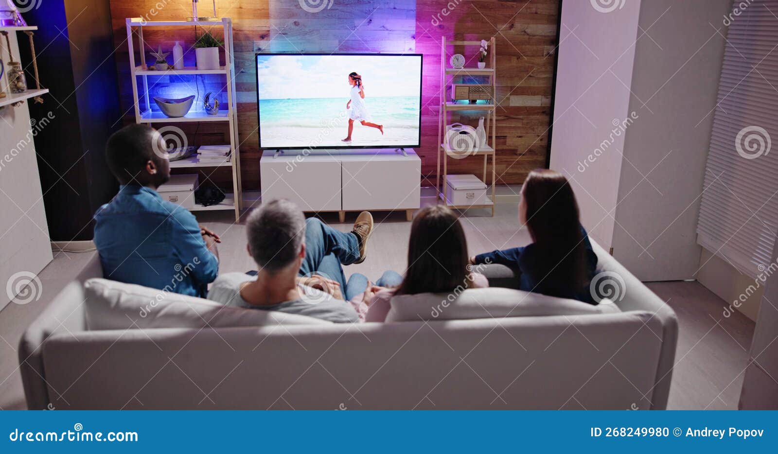 Couples Watching TV at Night Stock Photo - Image of living, sofa: 268249980