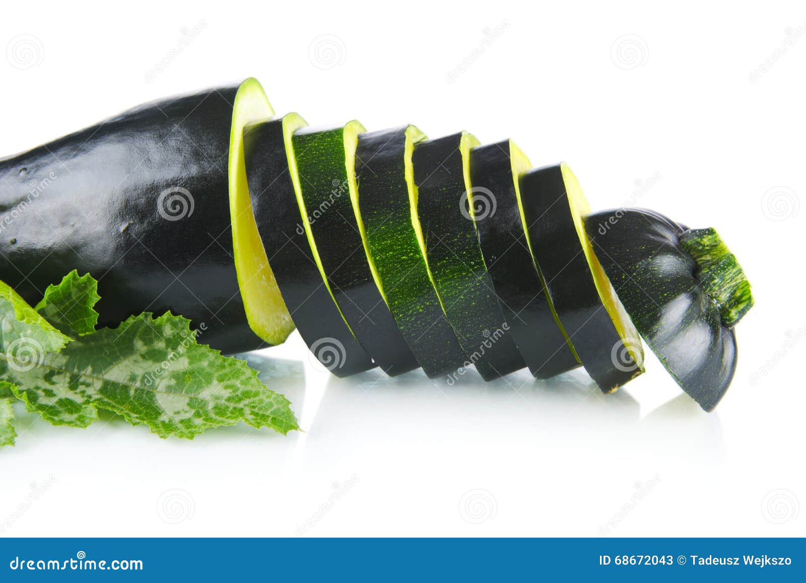 Courgette Cut into Slices and Leaves on White Stock Image - Image of ...