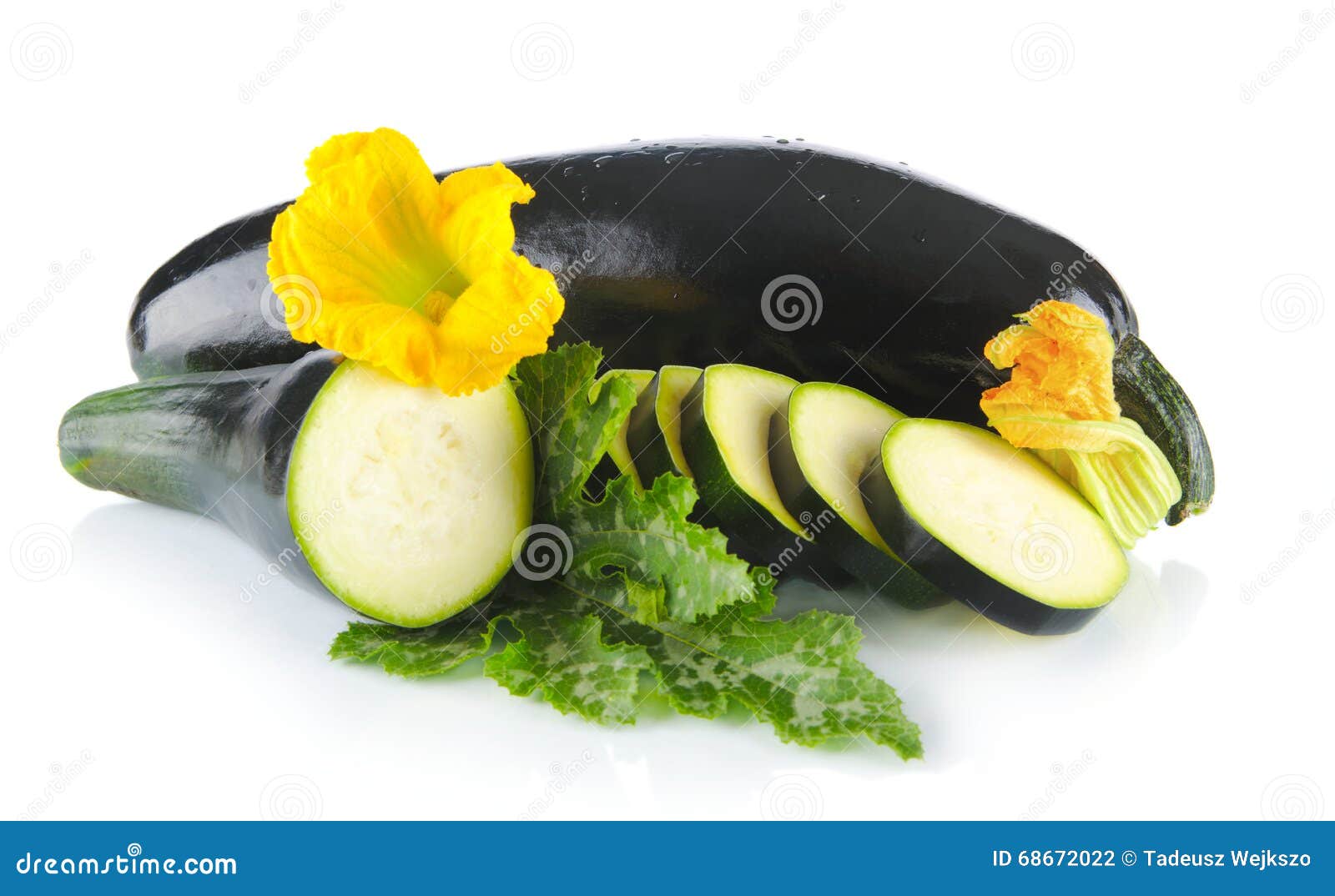 Courgettes Cut into Slices with Flower and Leaf on White Stock Photo ...