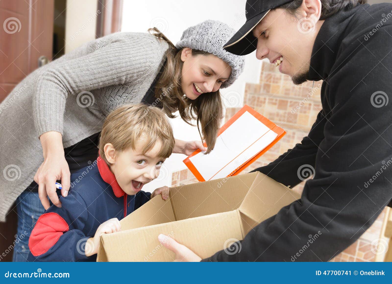 Courier Delivering a Package Stock Image - Image of postman, cardboard ...