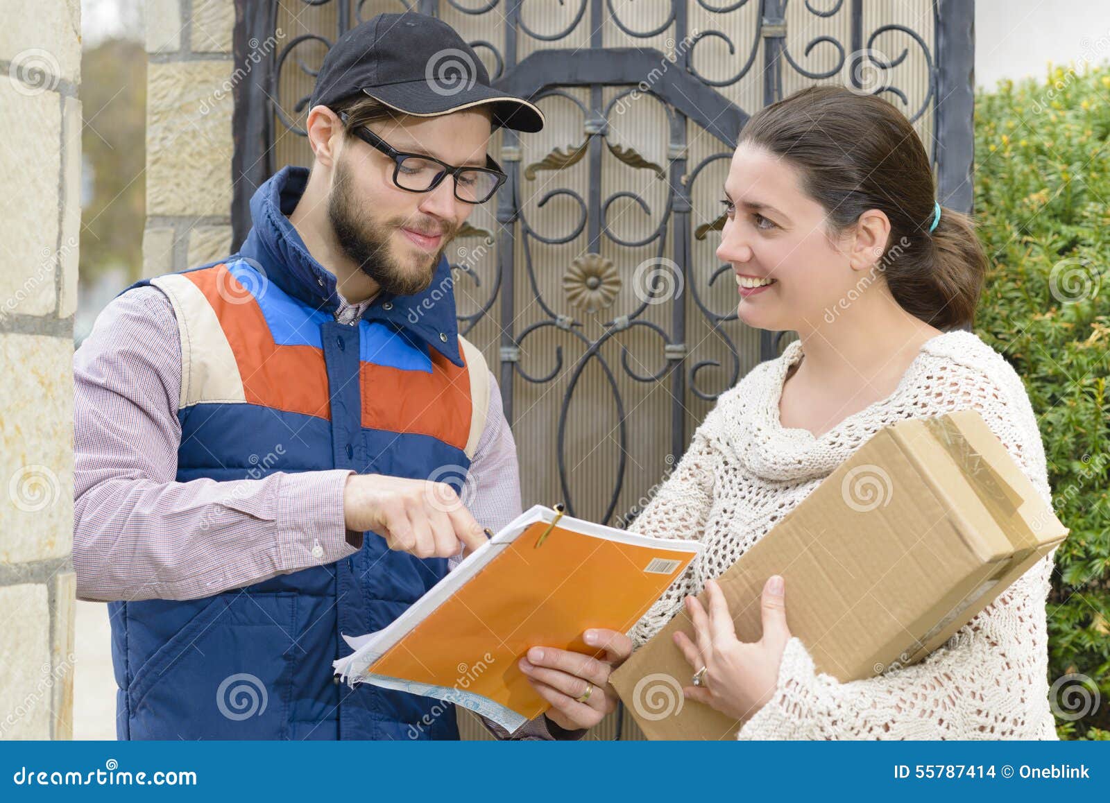 Courier Delivering a Package Stock Photo - Image of astonishment ...