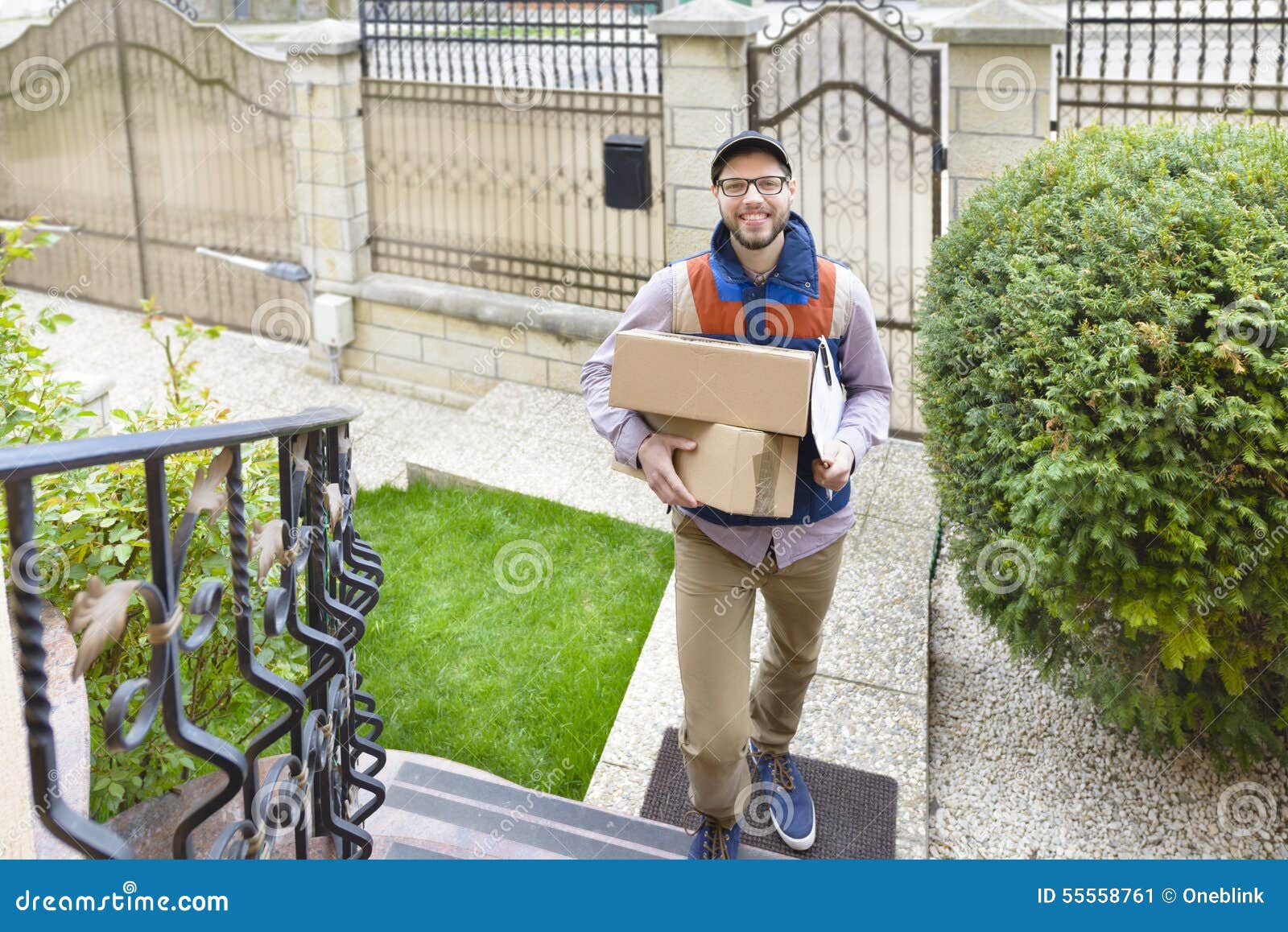 Courier Delivering a Package Stock Image - Image of mailman, occupation ...