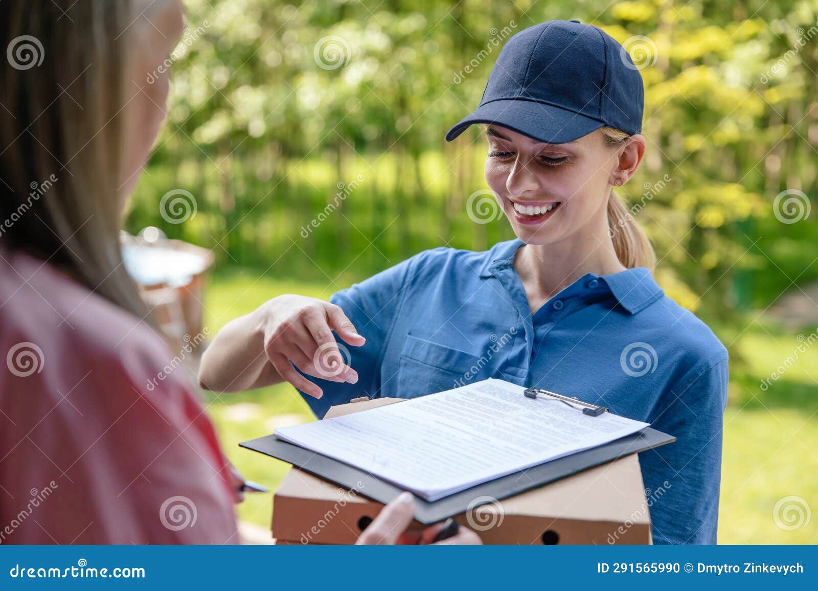 Courier Delivering Parcel, Customer Signs the Delivery Documents. Stock ...