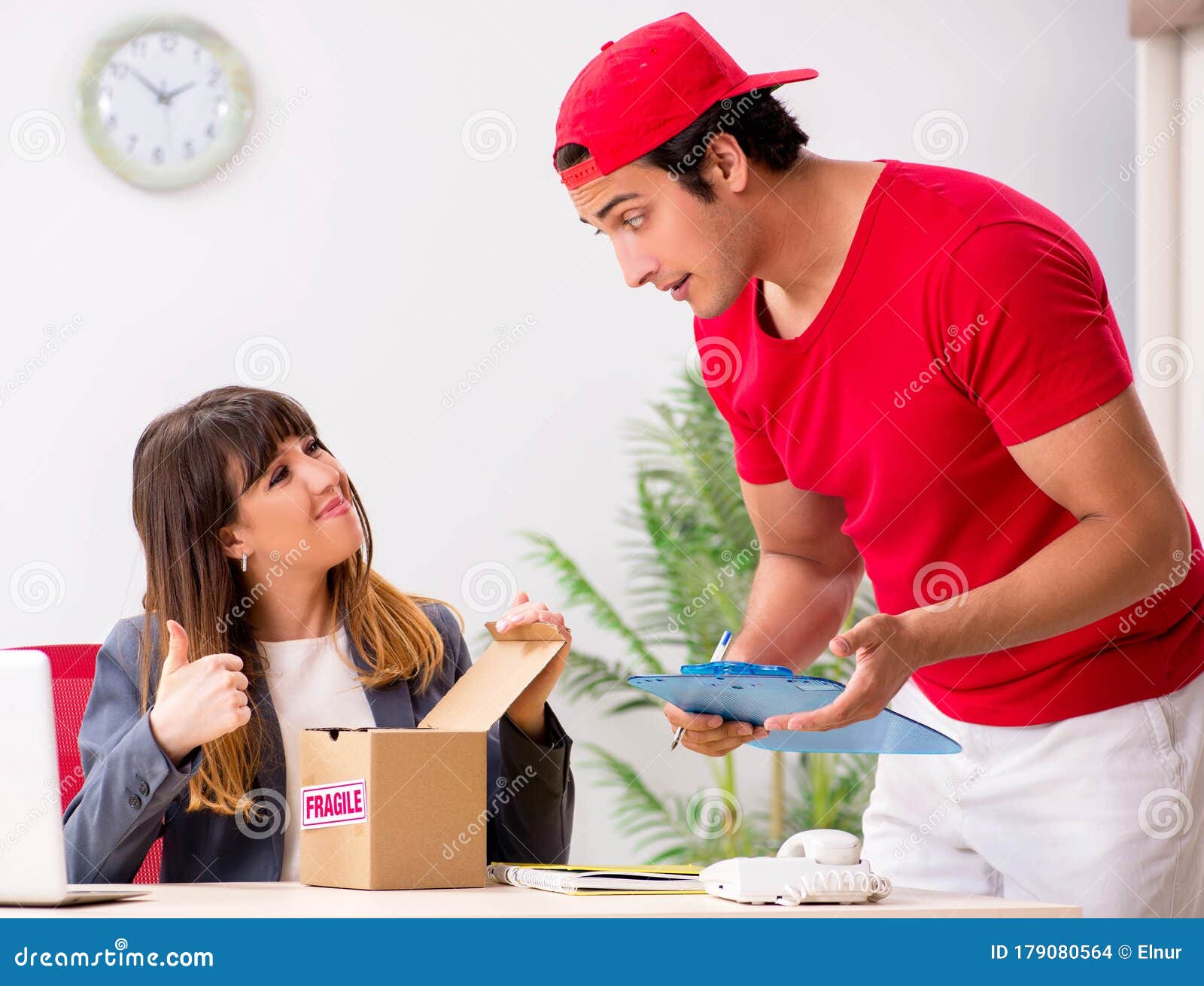 Courier Delivering Parcel To the Office Stock Photo - Image of label ...