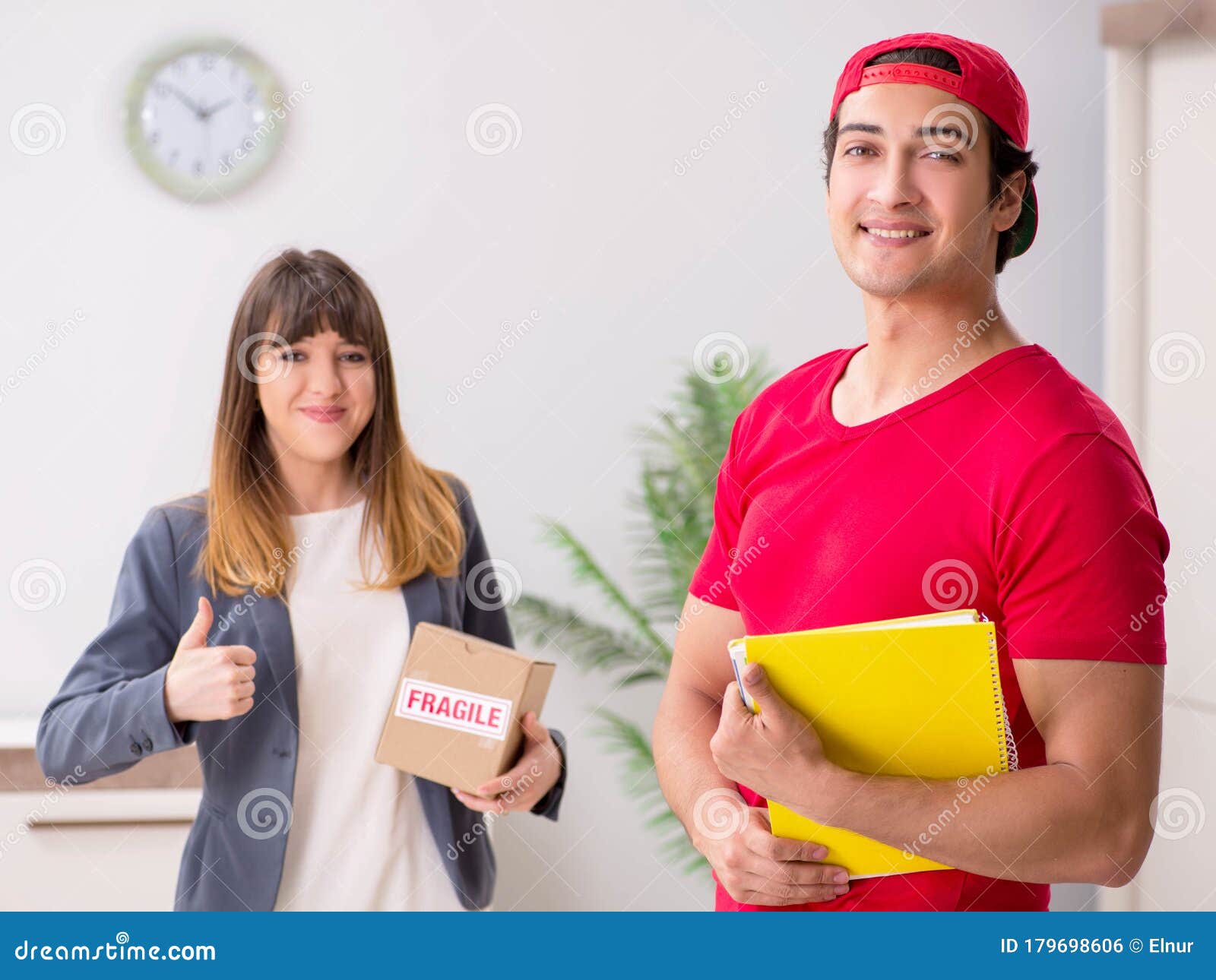 Courier Delivering Parcel To the Office Stock Photo - Image of holding ...