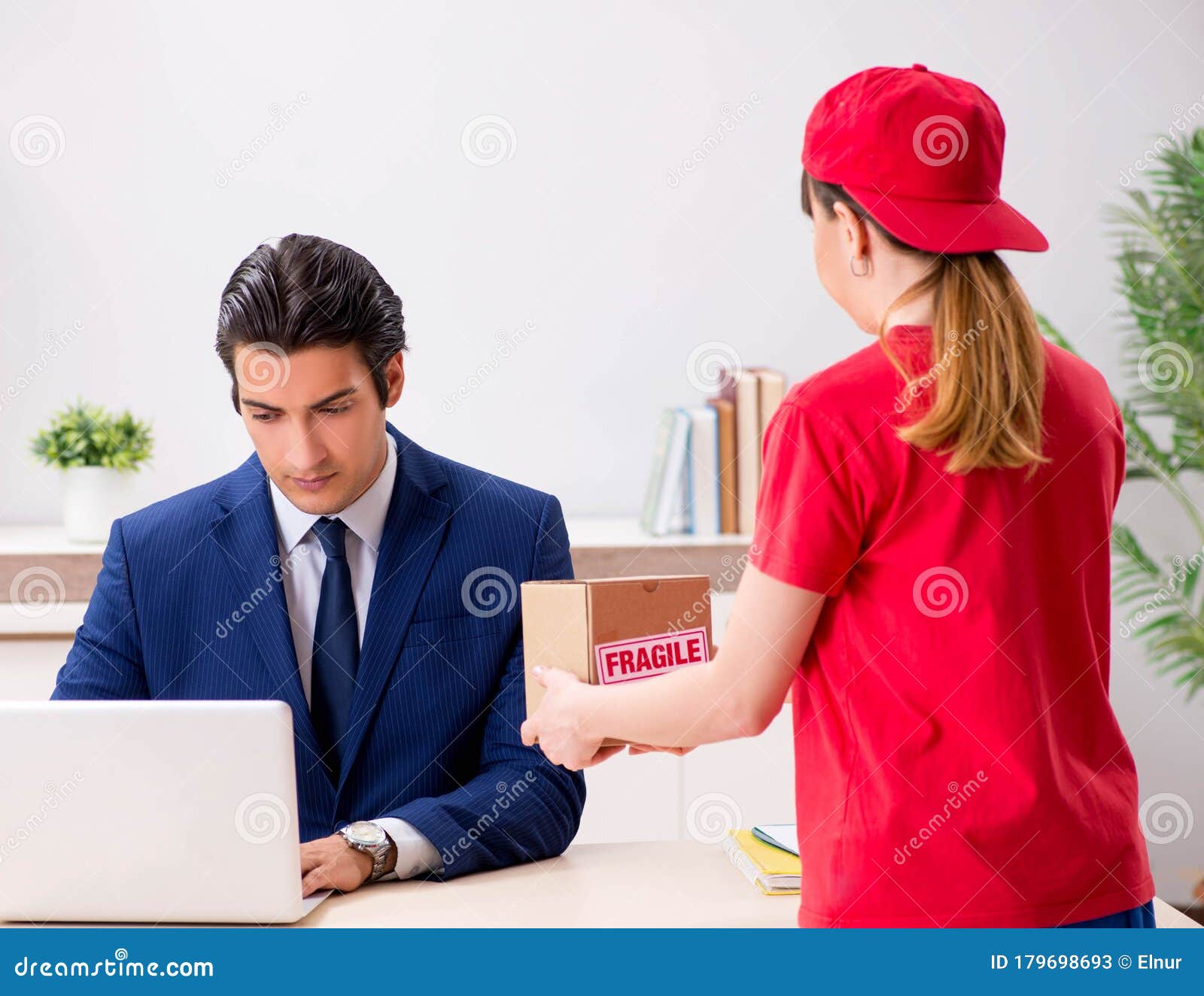 Courier Delivering Parcel To the Office Stock Image - Image of fragile ...