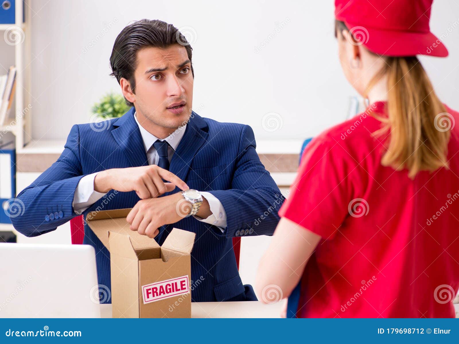 Courier Delivering Parcel To the Office Stock Photo - Image of ...
