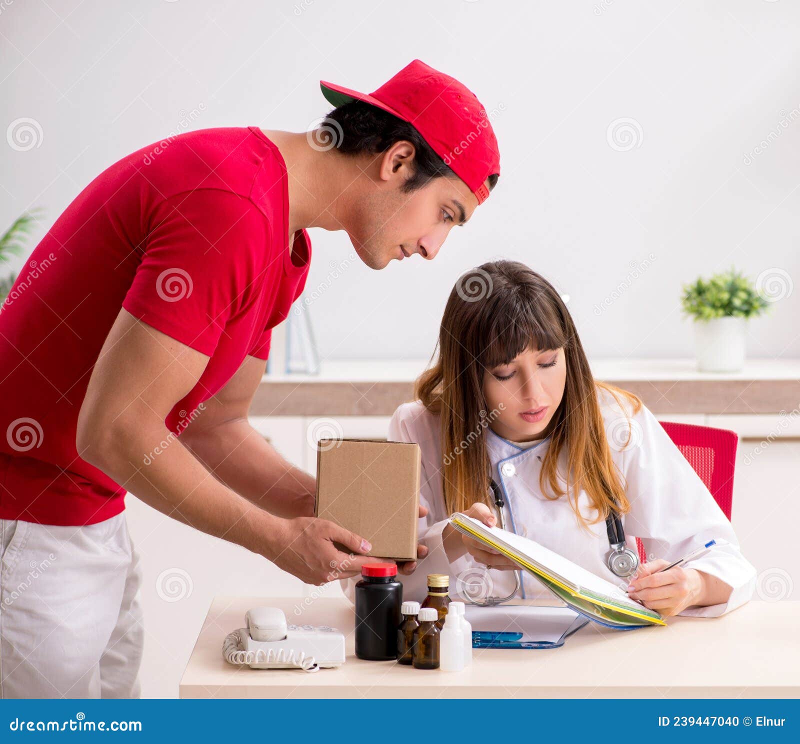 The Courier Delivering Urgent Parcel To the Hospital Stock Photo ...