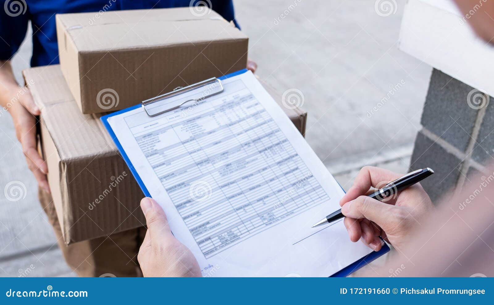 Courier Delivery Man Checking or Holding Cardboard Parcel Package To ...