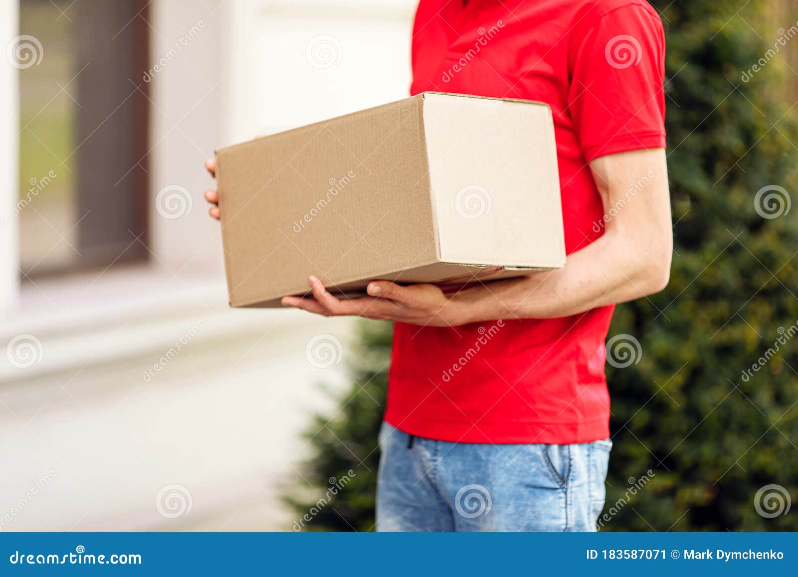 Courier Delivery Service with Parcels in Hand in the Open Air Stock ...