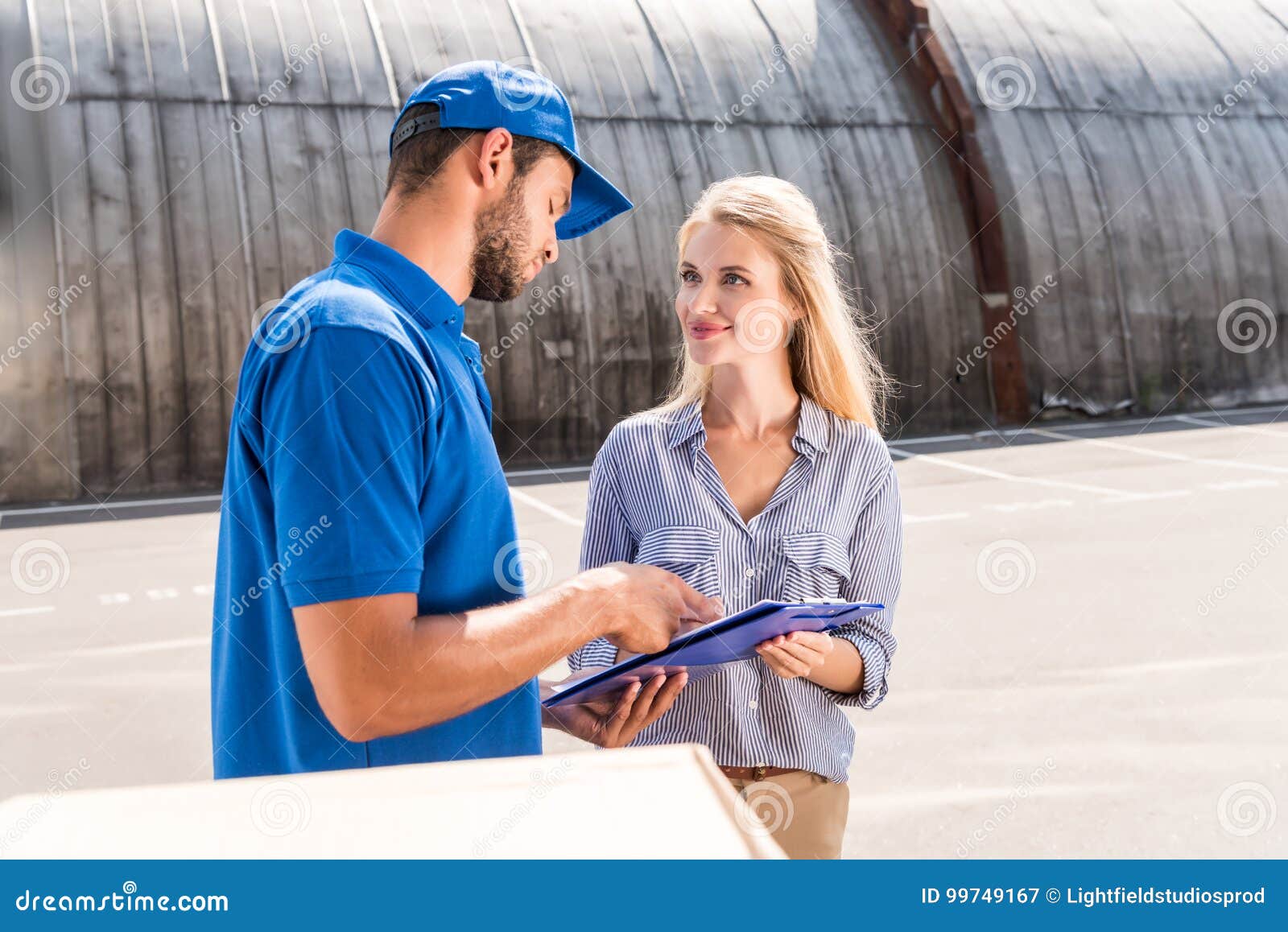 Woman Signing Delivery Document Stock Image - Image of paper, order ...