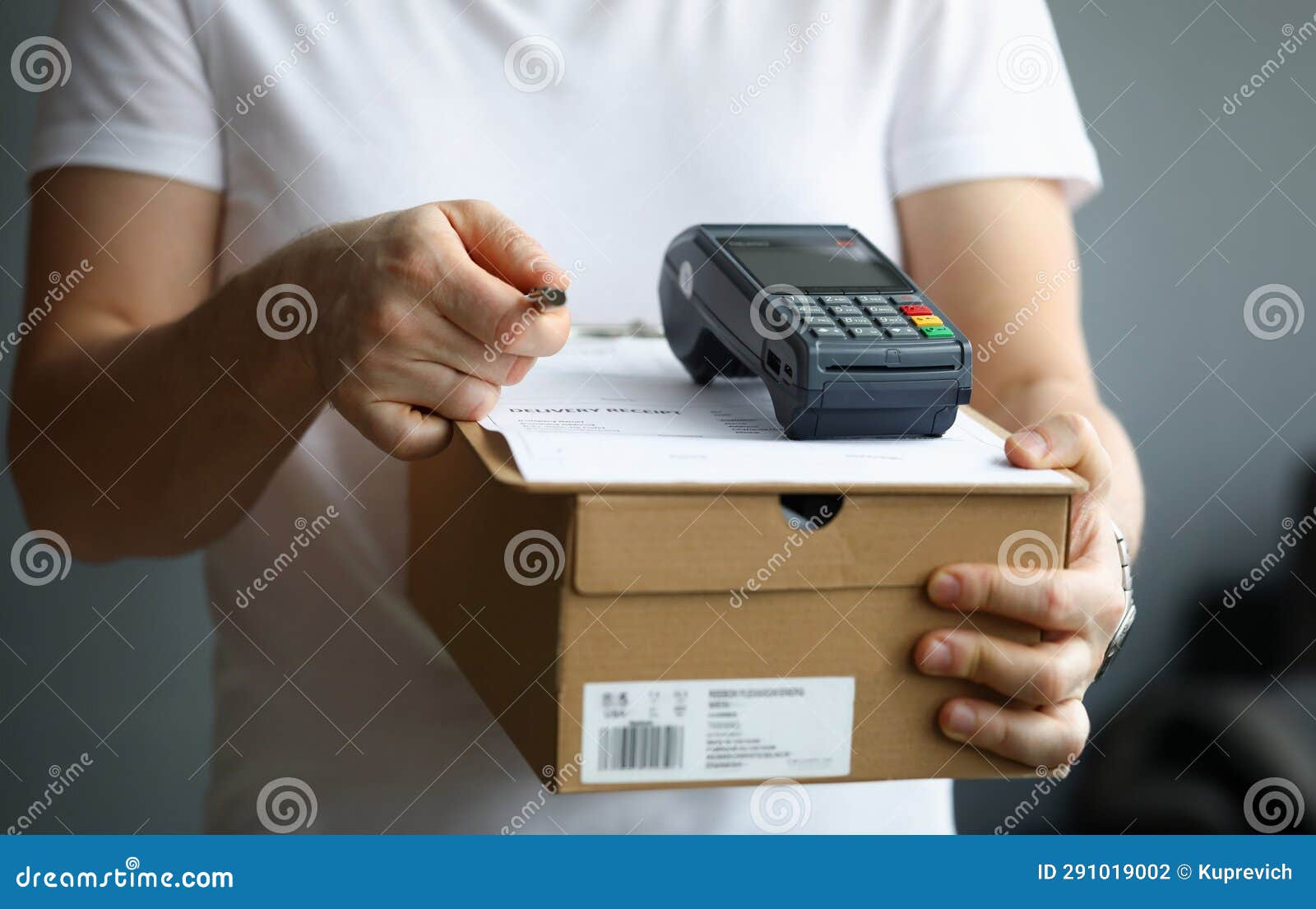 Courier Holds Cardboard Box with Payment Terminal and Documents with ...