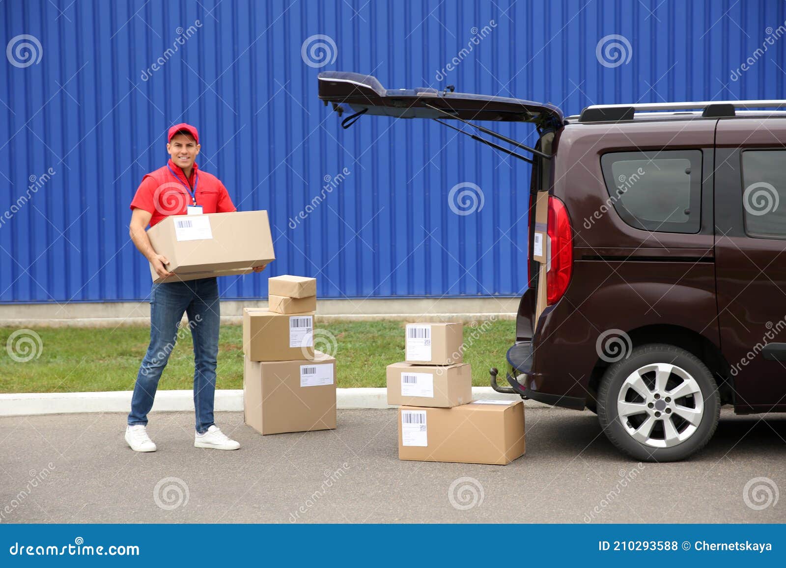 Courier Loading Packages in Car Trunk Outdoors Stock Photo - Image of ...