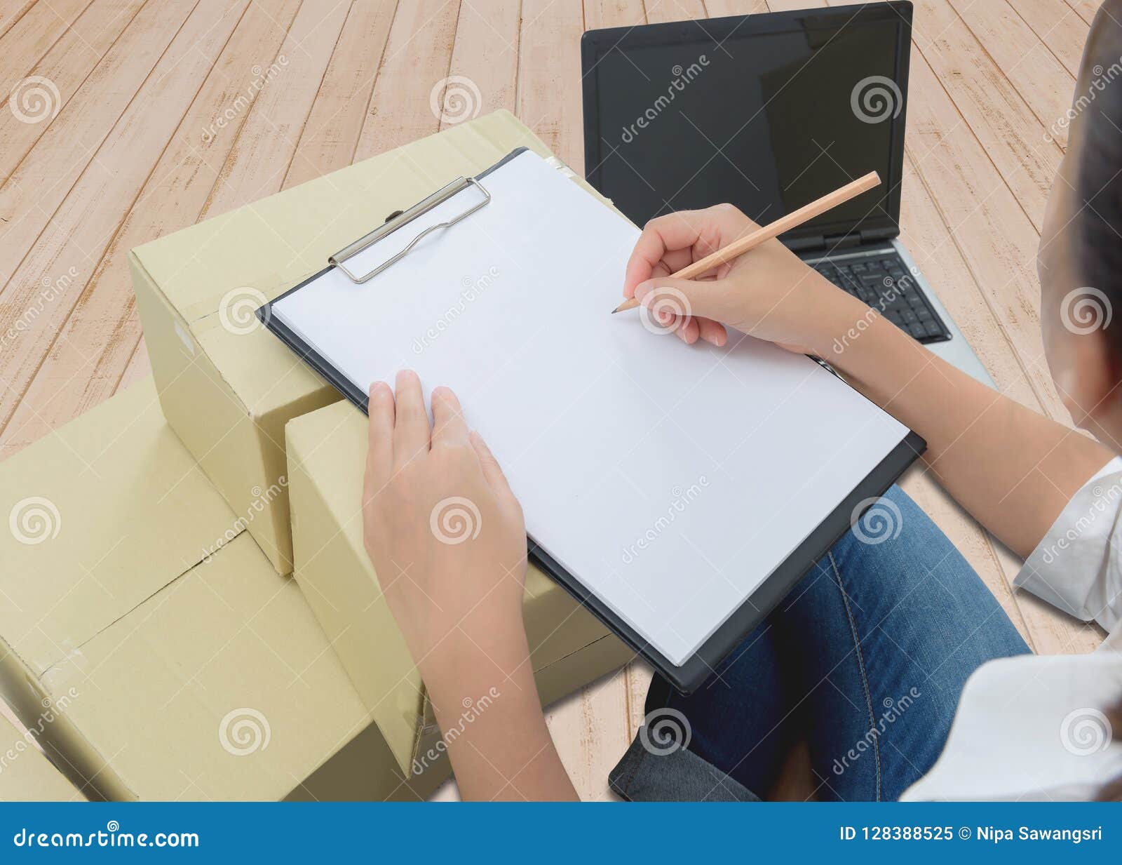 Courier Making Notes in Delivery Receipt among Parcels on Boxes Stock ...