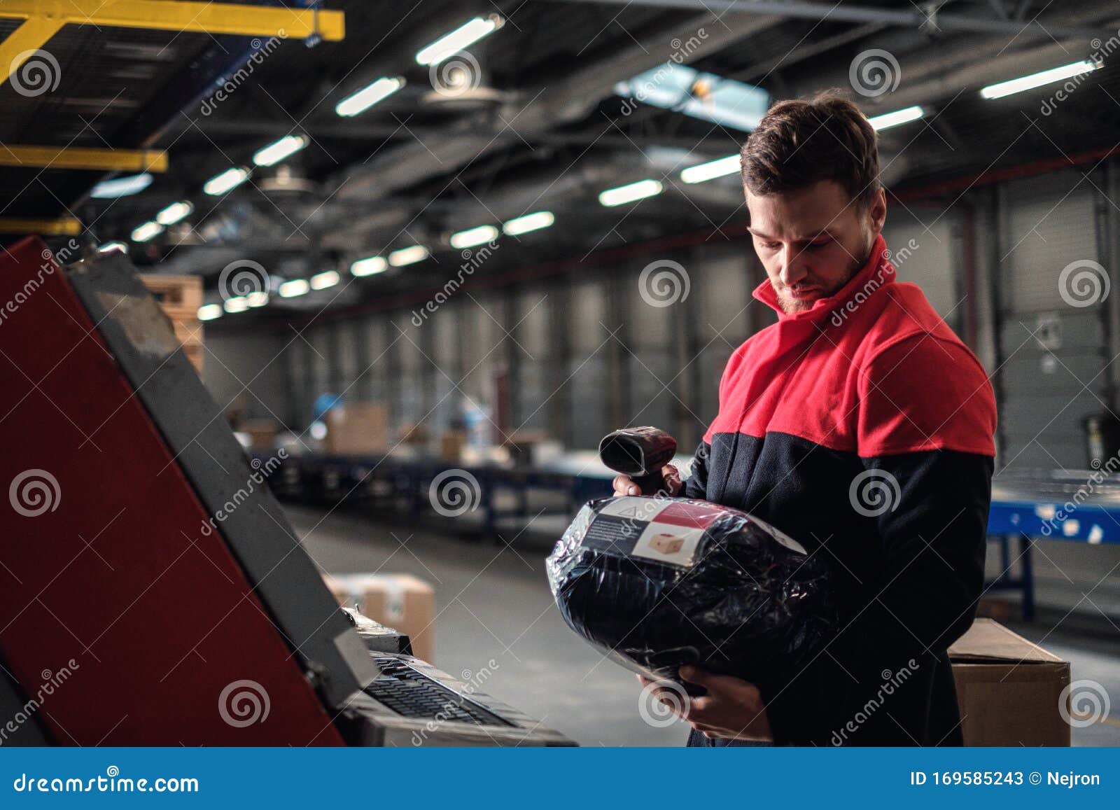 Courier Picks Up Package on a Warehouse Stock Image - Image of order ...