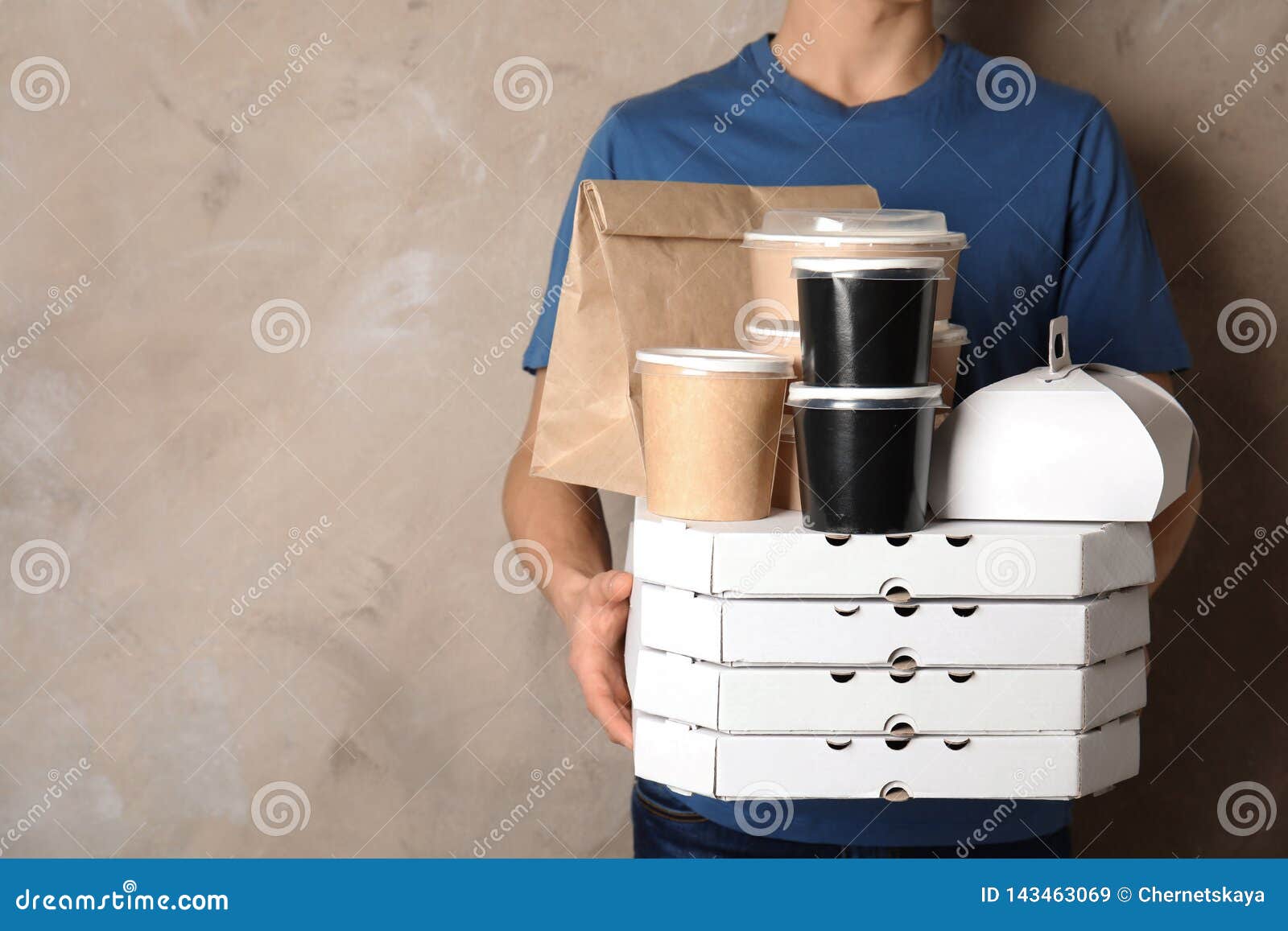 Courier with Stack of Orders on Beige Background. Food Delivery Service ...