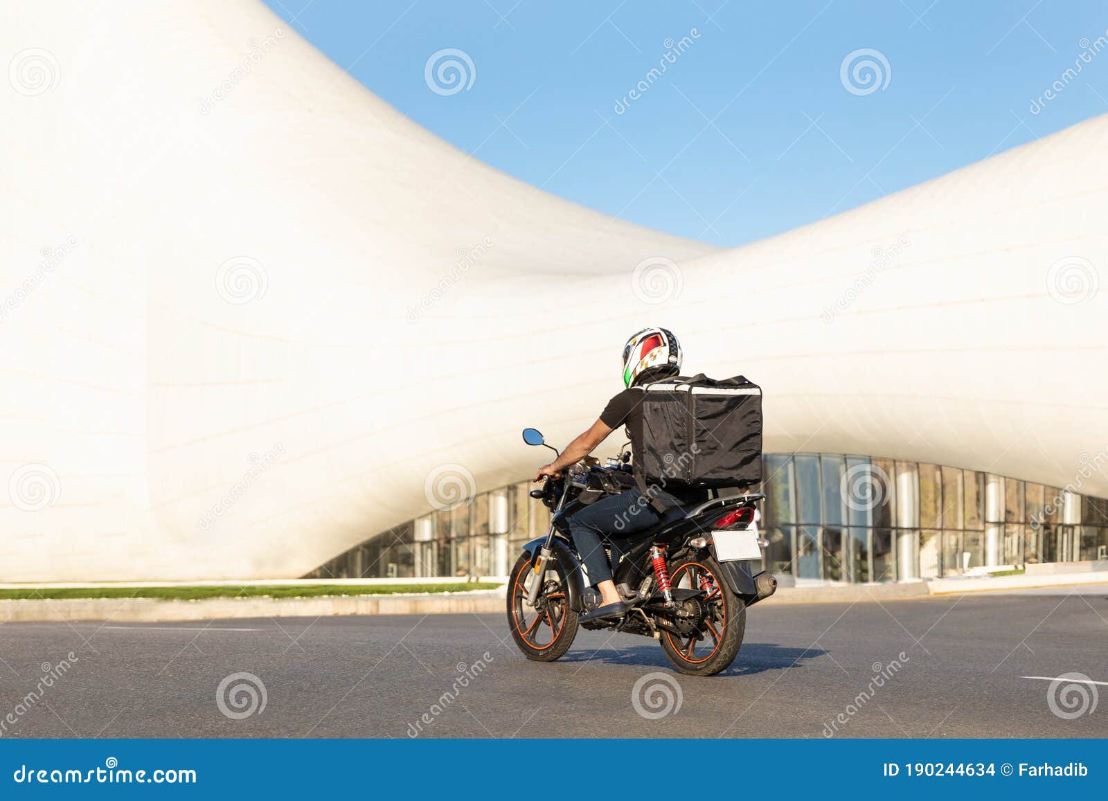 Courier Worker Driving a Motorcycle in the City Stock Photo - Image of ...