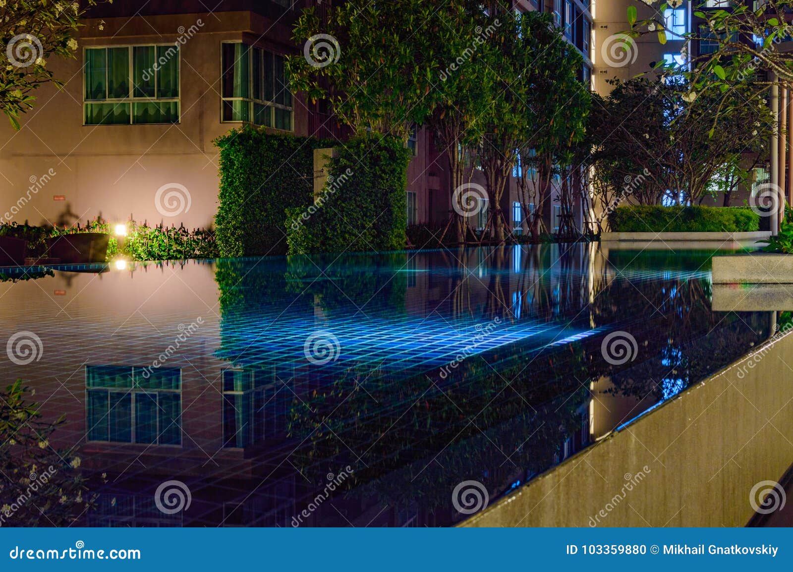 Courtyard of an Apartment House with Shallow Blue Pool Stock Photo ...