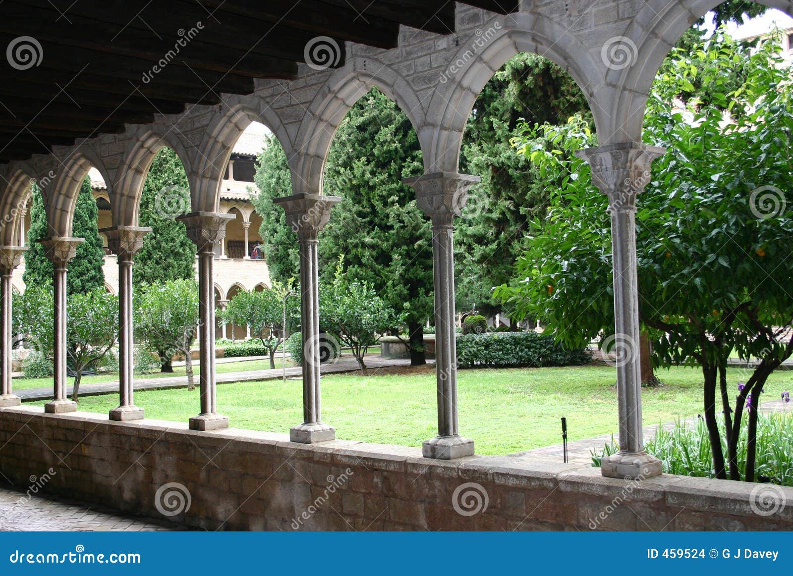 Courtyard through arches stock photo. Image of columns - 459524