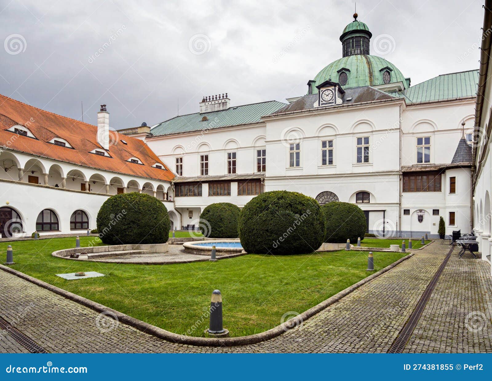 Courtyard Of Castle With Tall Brick Walls Stock Photography ...