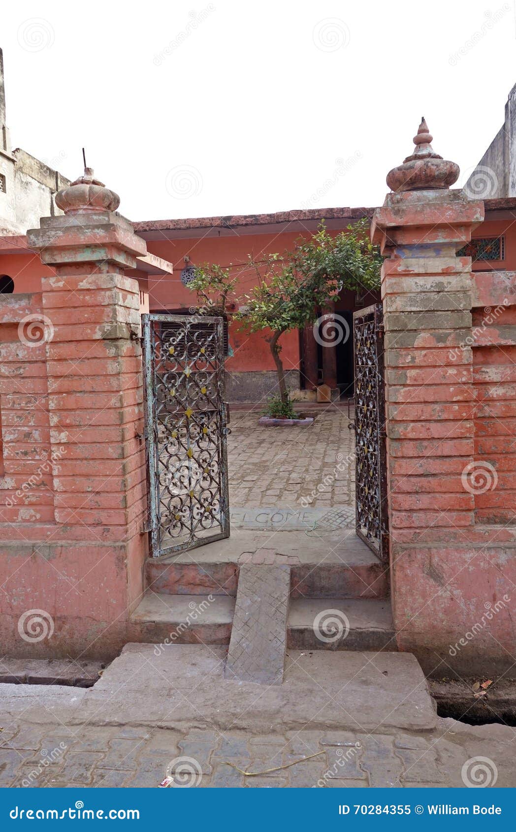 Courtyard Entry Gate With Tile Roof Buried In Sand In The Desert In ...