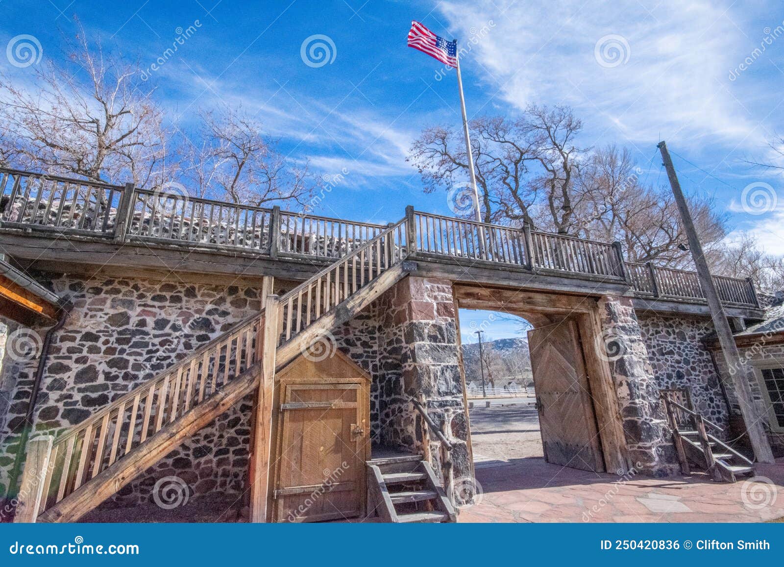 Cove Fort Entrance with American Flag Stock Photo - Image of pioneer ...