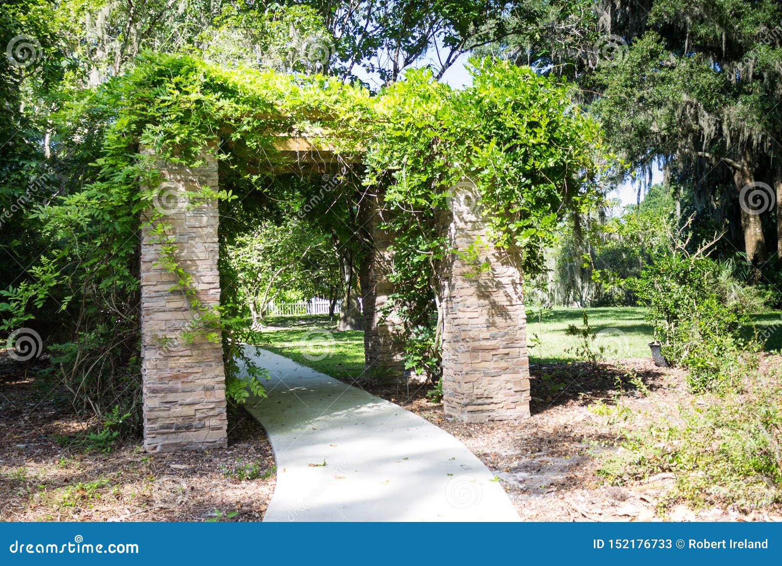 Stone covered Archway Path stock image. Image of green - 152176733