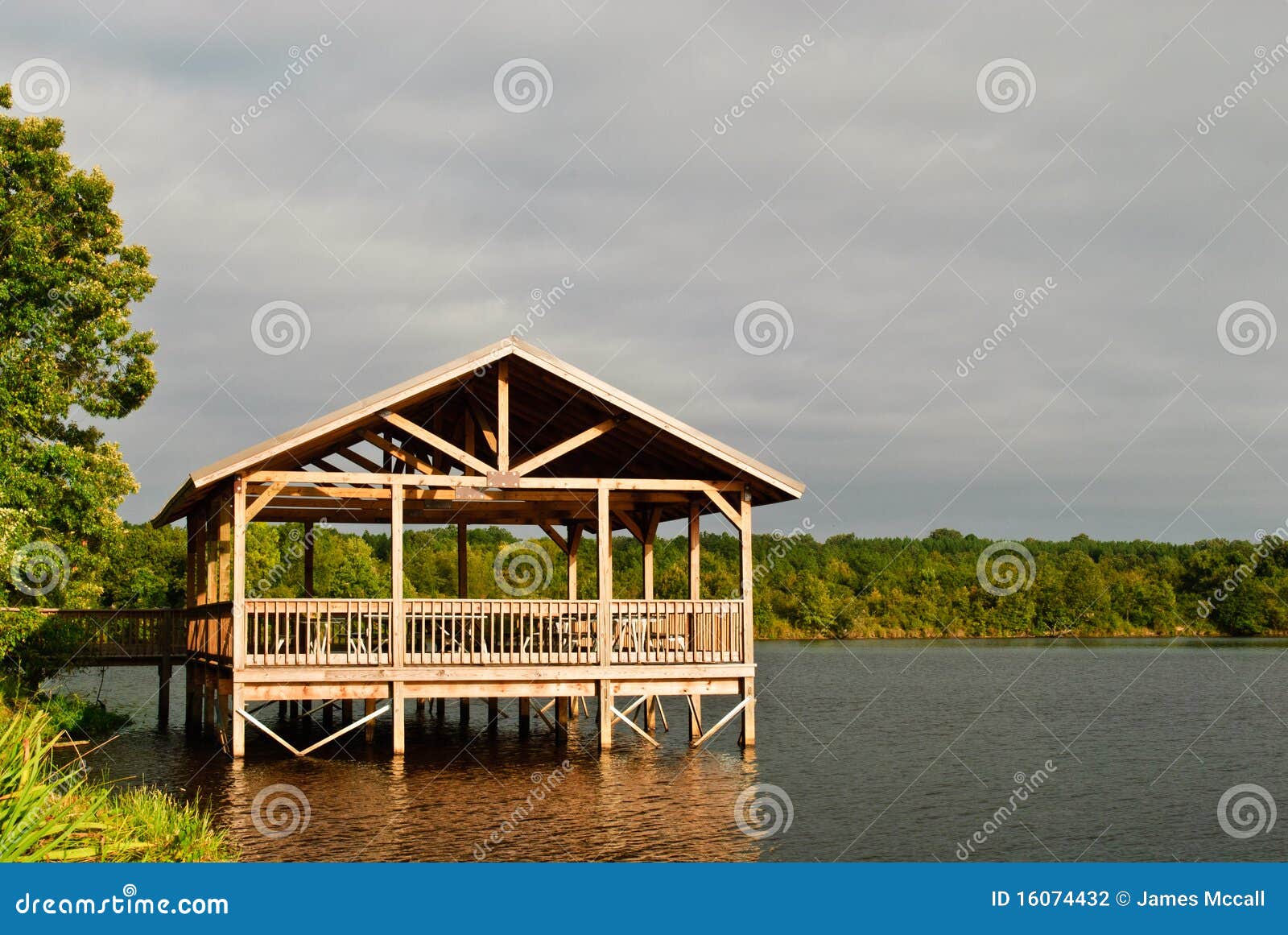Covered deck on lake stock photo. Image of lake, decking - 16074432