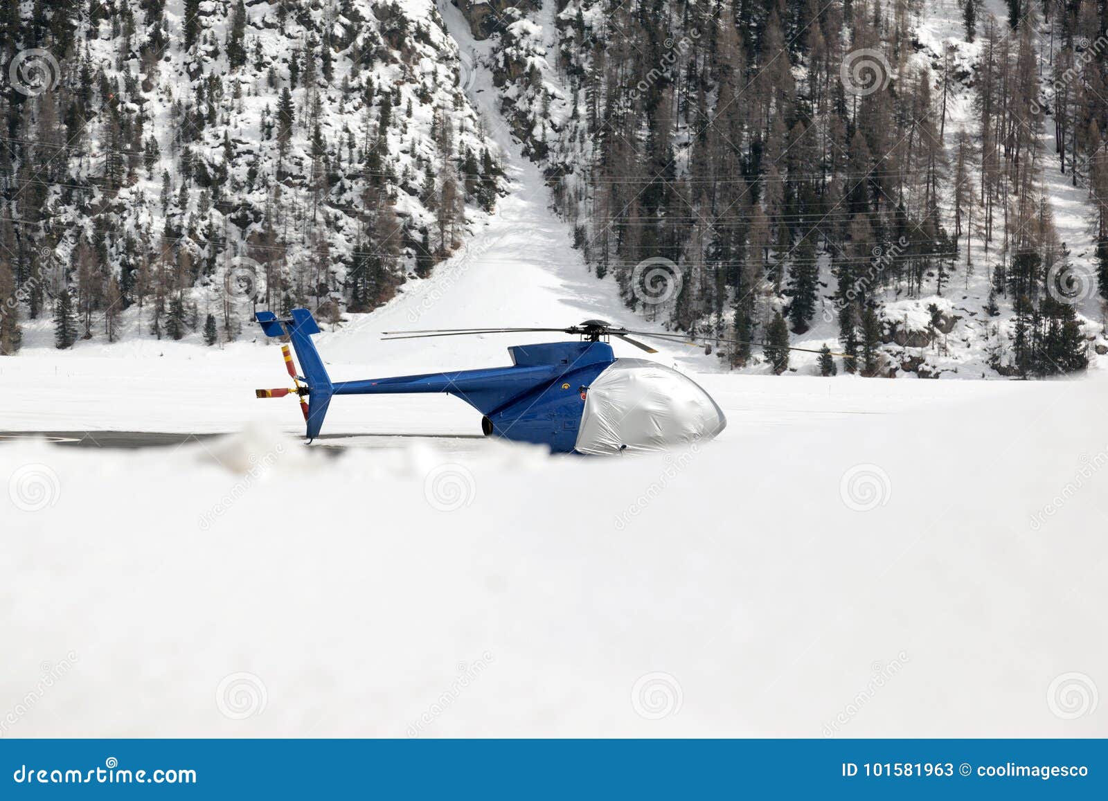 A Covered Helicopter in the Beautiful Snow Covered Landscape Stock ...