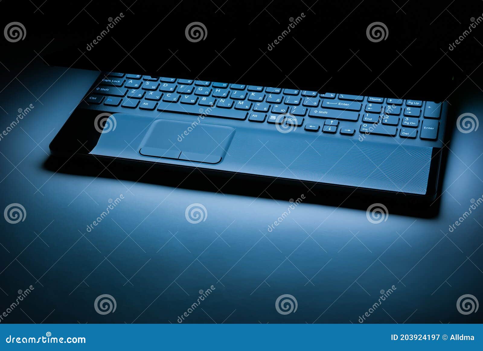 The Covered Laptop with the Light in the Dark Stock Image - Image of ...