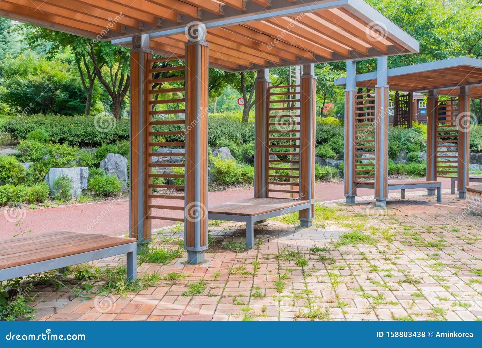 Covered park benches stock photo. Image of eastern, picnic - 158803438