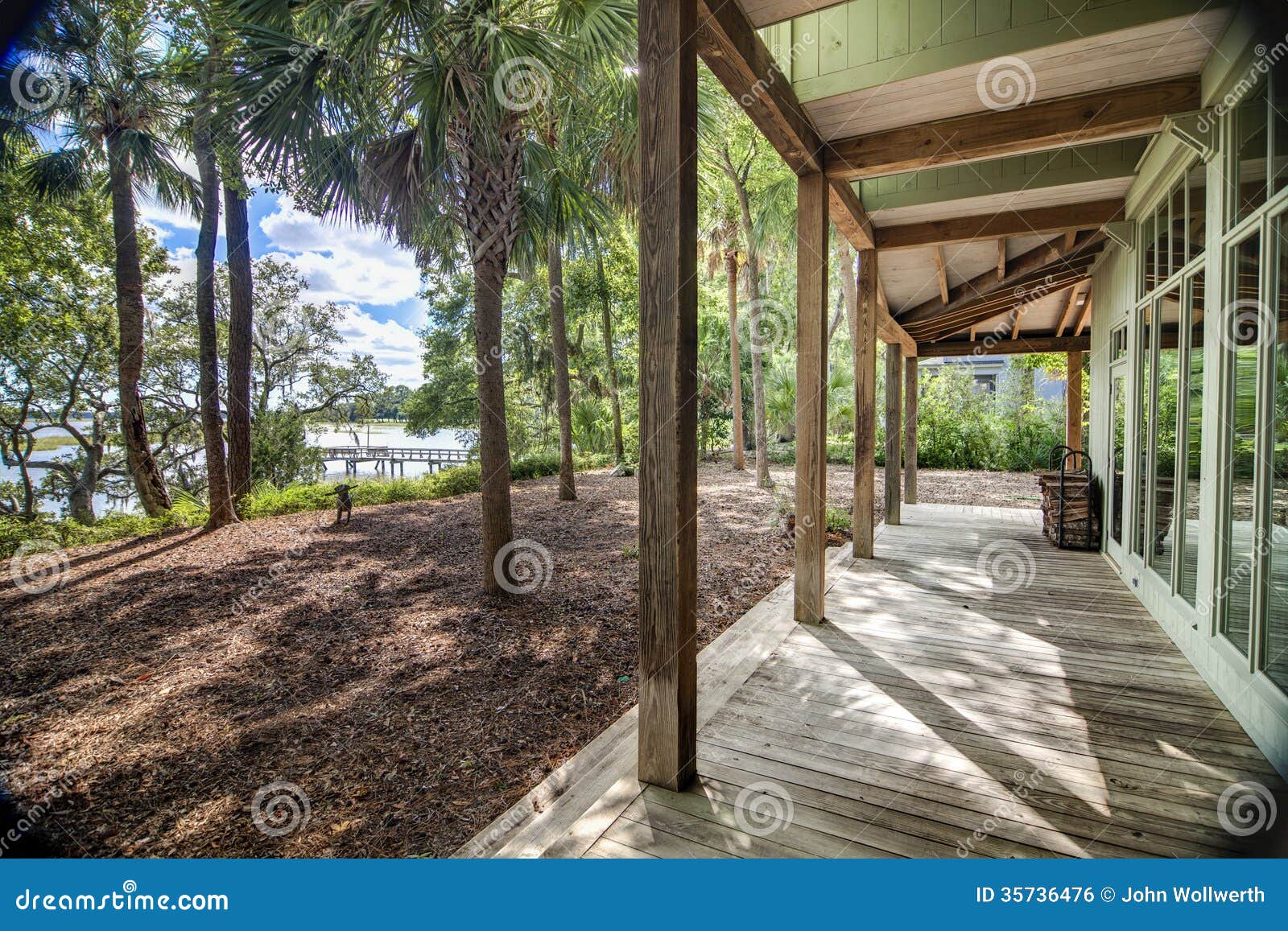 Covered Porch with Waterfront View Stock Photo - Image of water, pine ...