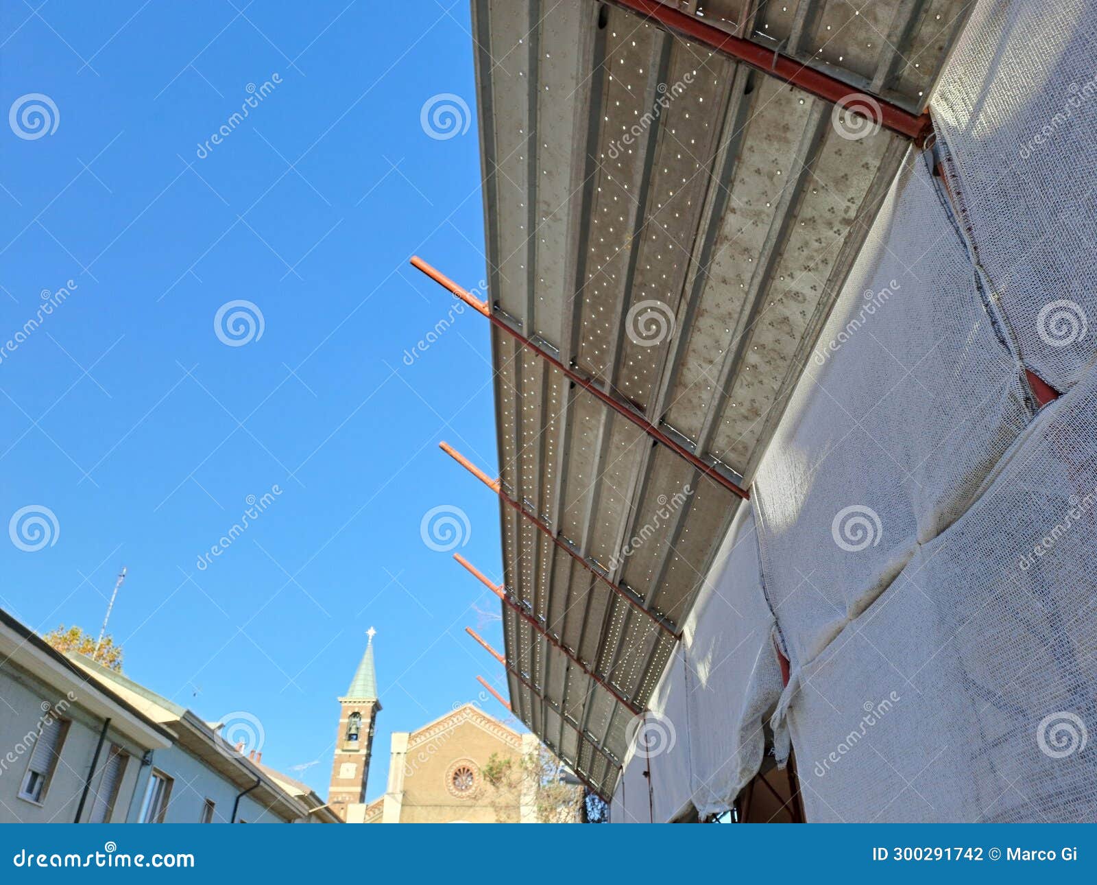 Covered Scaffolding by a Building Under Renovation Stock Photo - Image ...