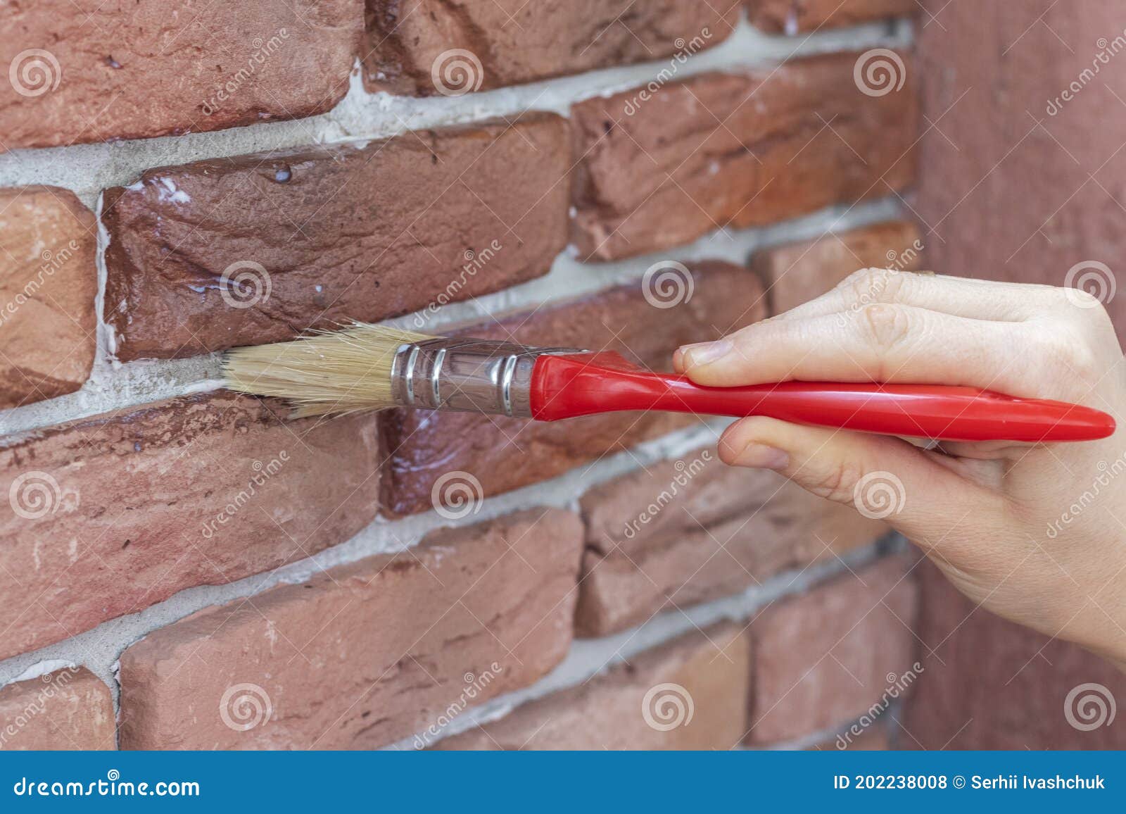 Covering of a Decorative Plaster Tile with a Protective Varnish. Stock ...