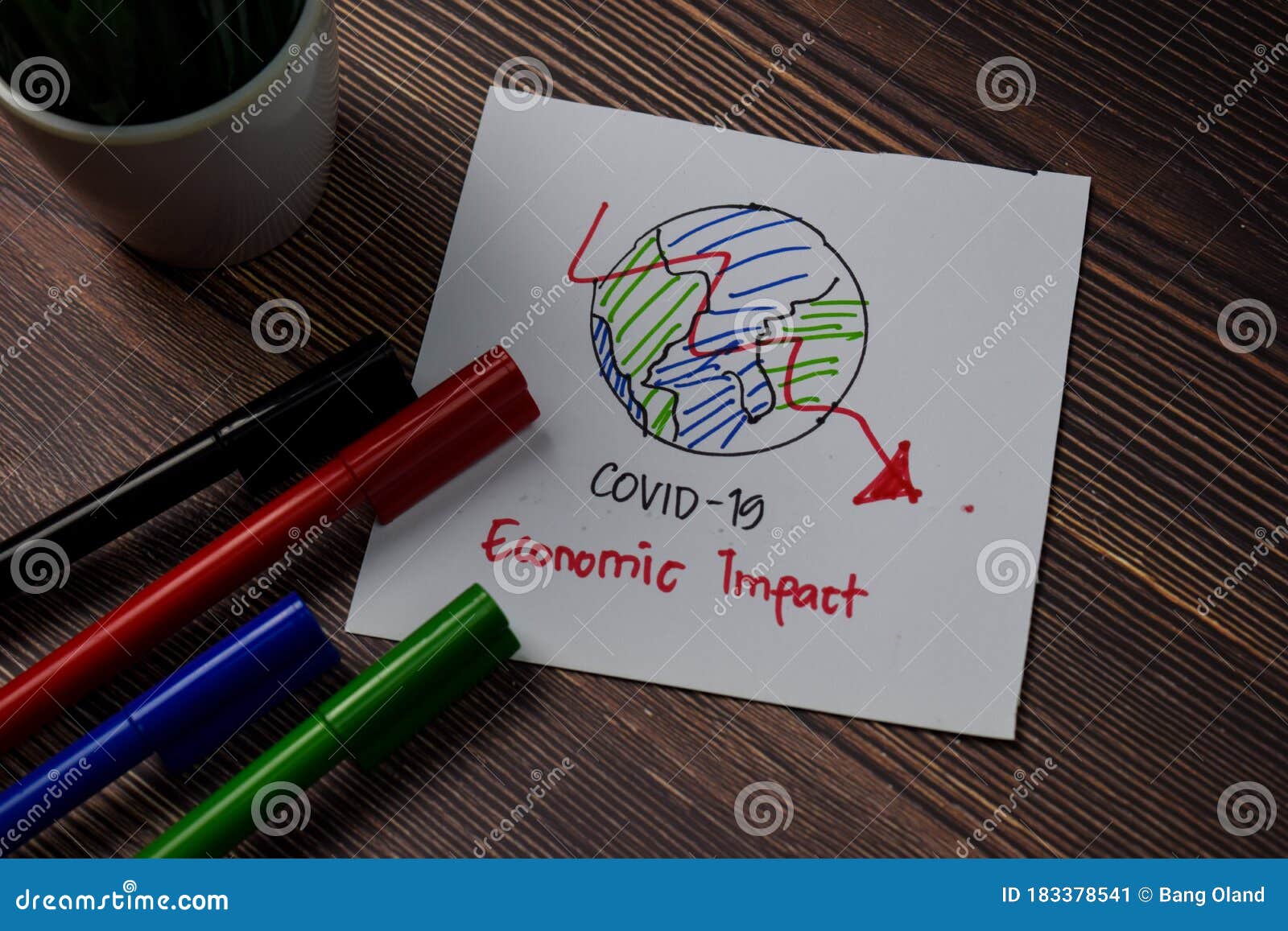 Covid 19 - Economic Impact Write on Sticky Note Isolated on Wooden ...
