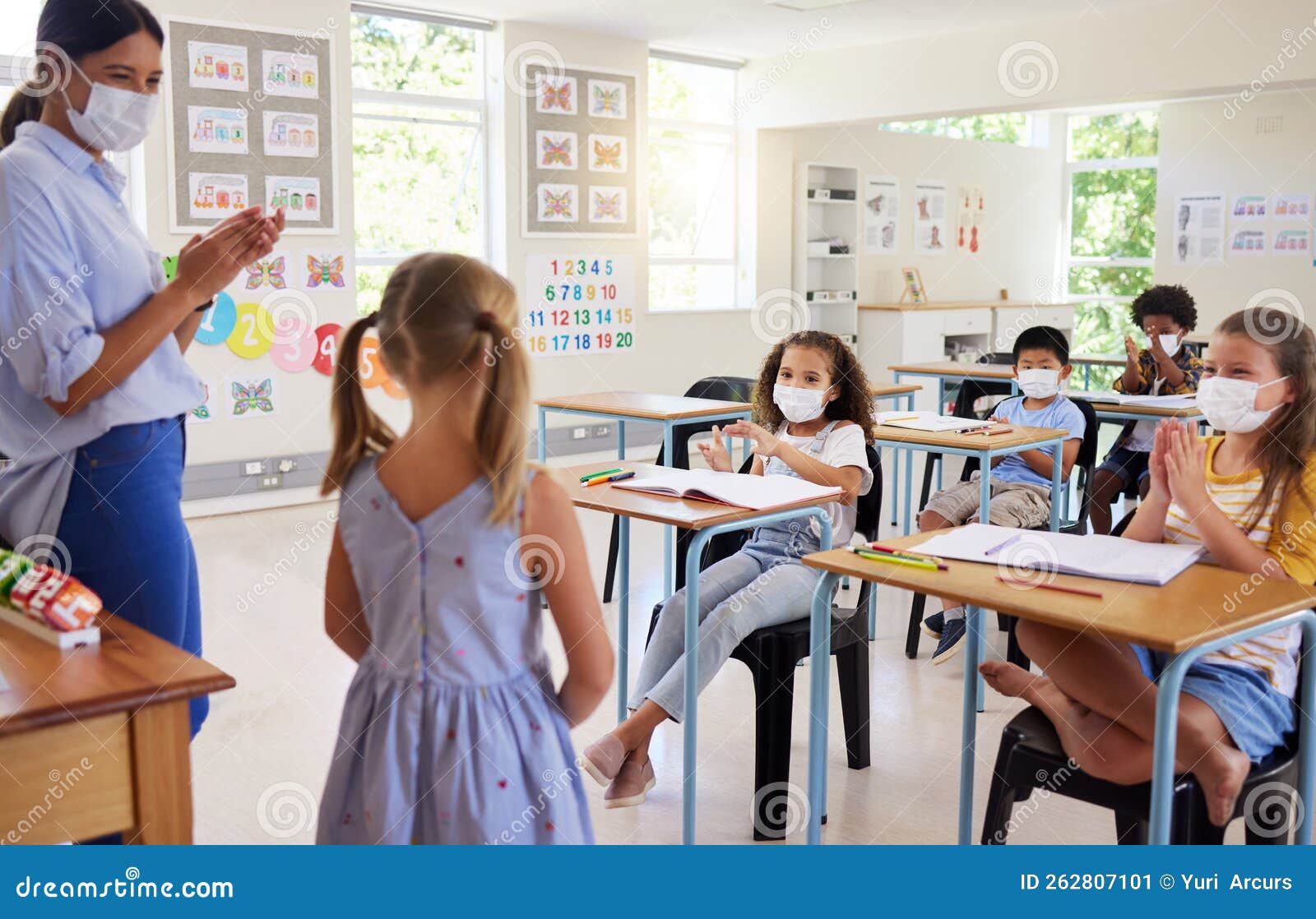 Covid, Education and Learning with a Teacher Wearing a Mask and ...