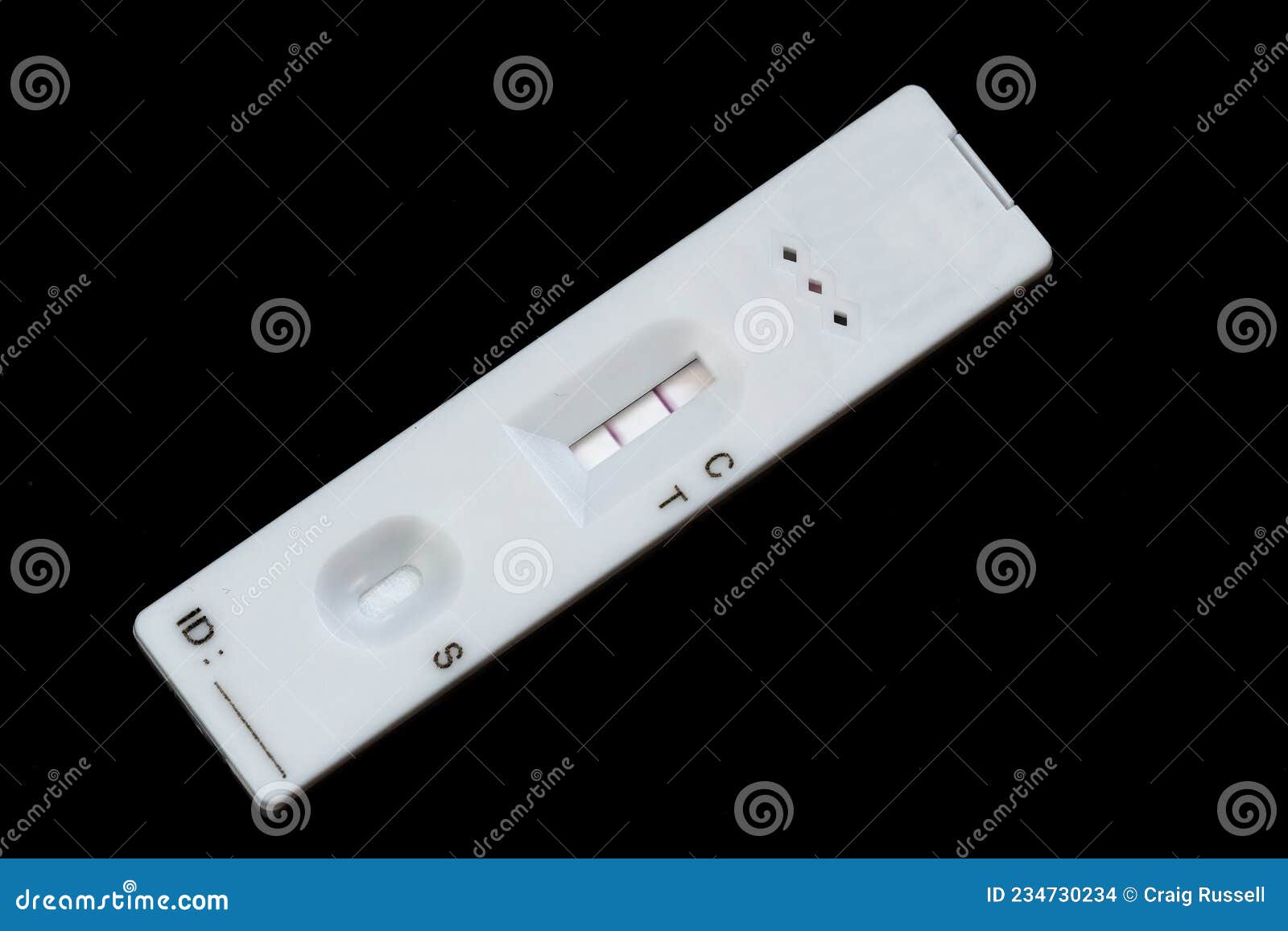 A Covid-19 Rapid Lateral Flow Test Showing a Positive Result Stock ...