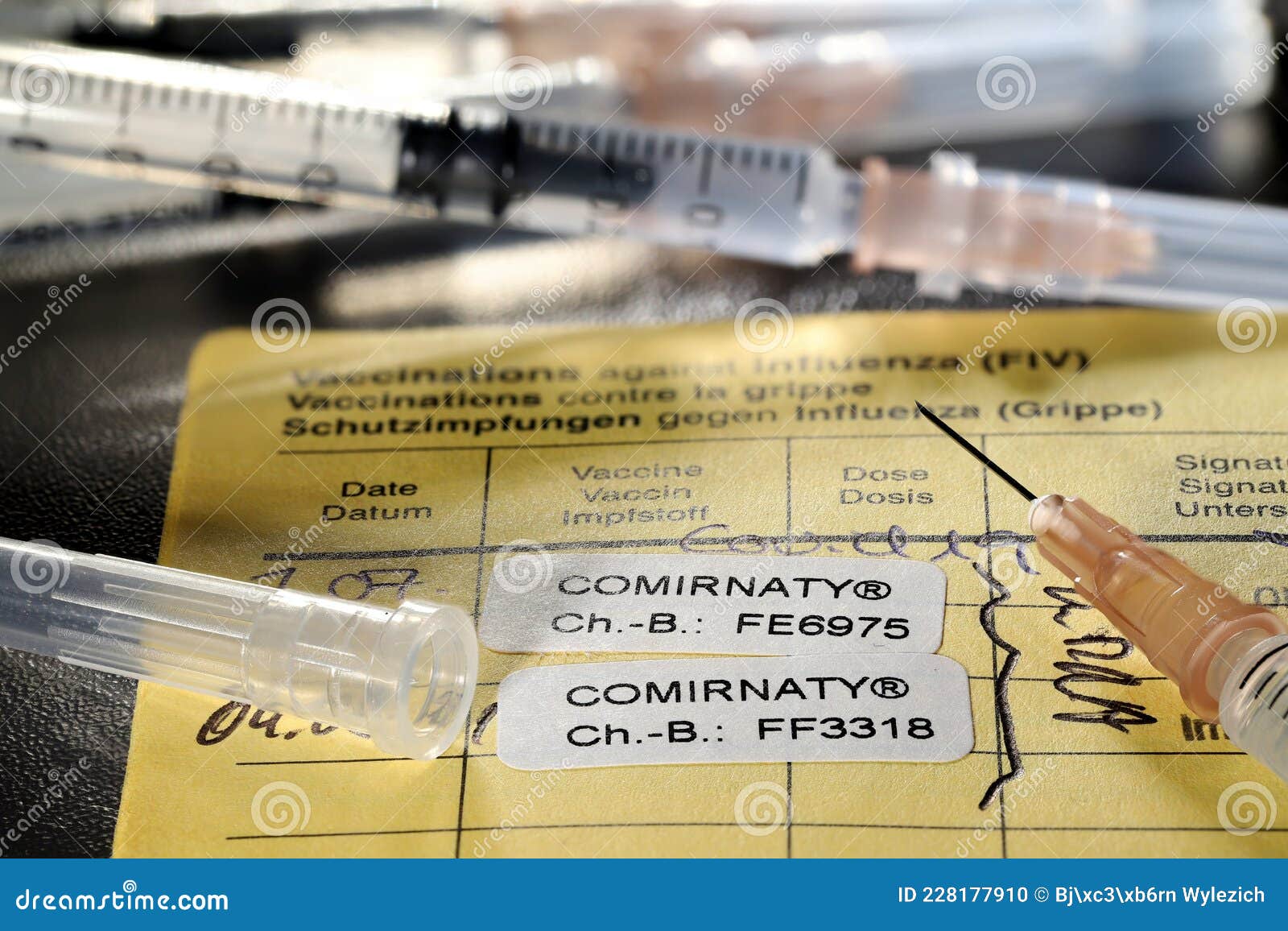 COVID-19 vaccination editorial image. Image of needle - 228177910