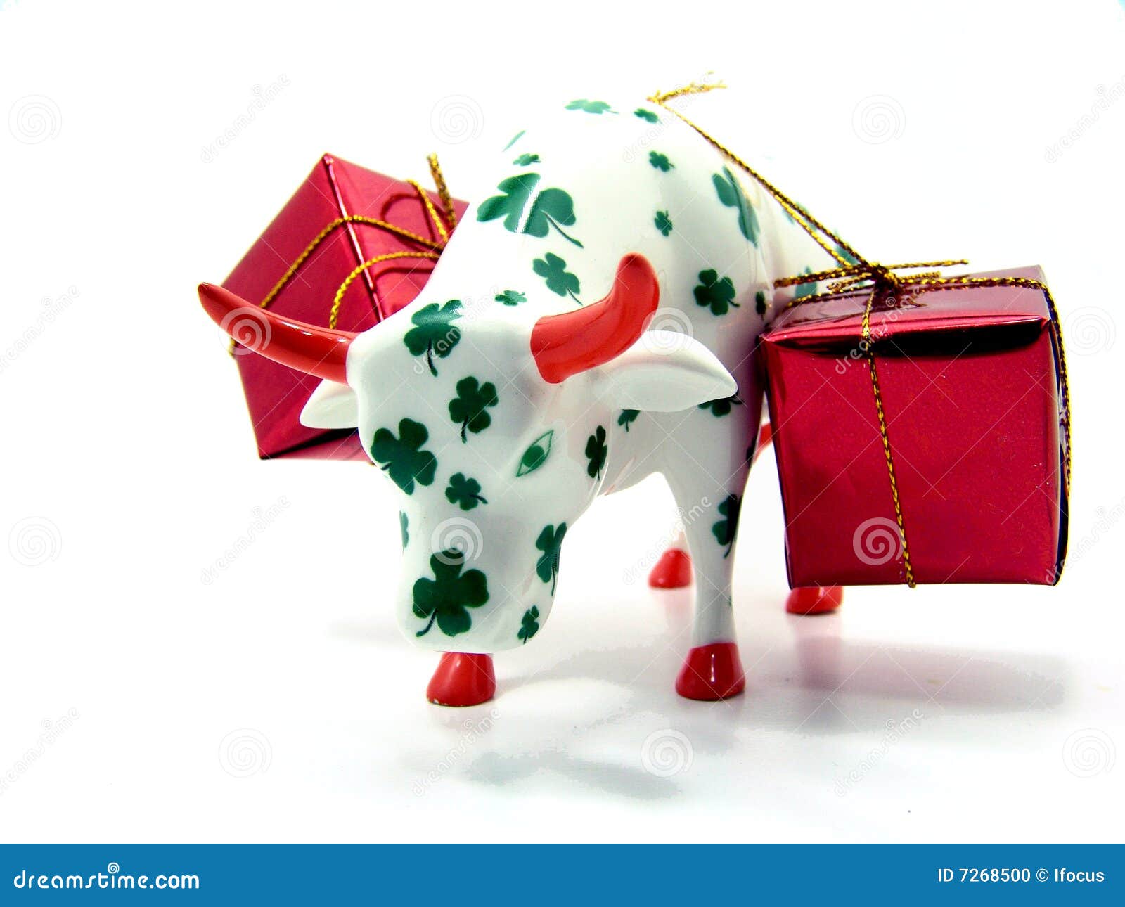 Porcelain Cow Carrying Gifts Stock Photo - Image of endow, present: 7268500