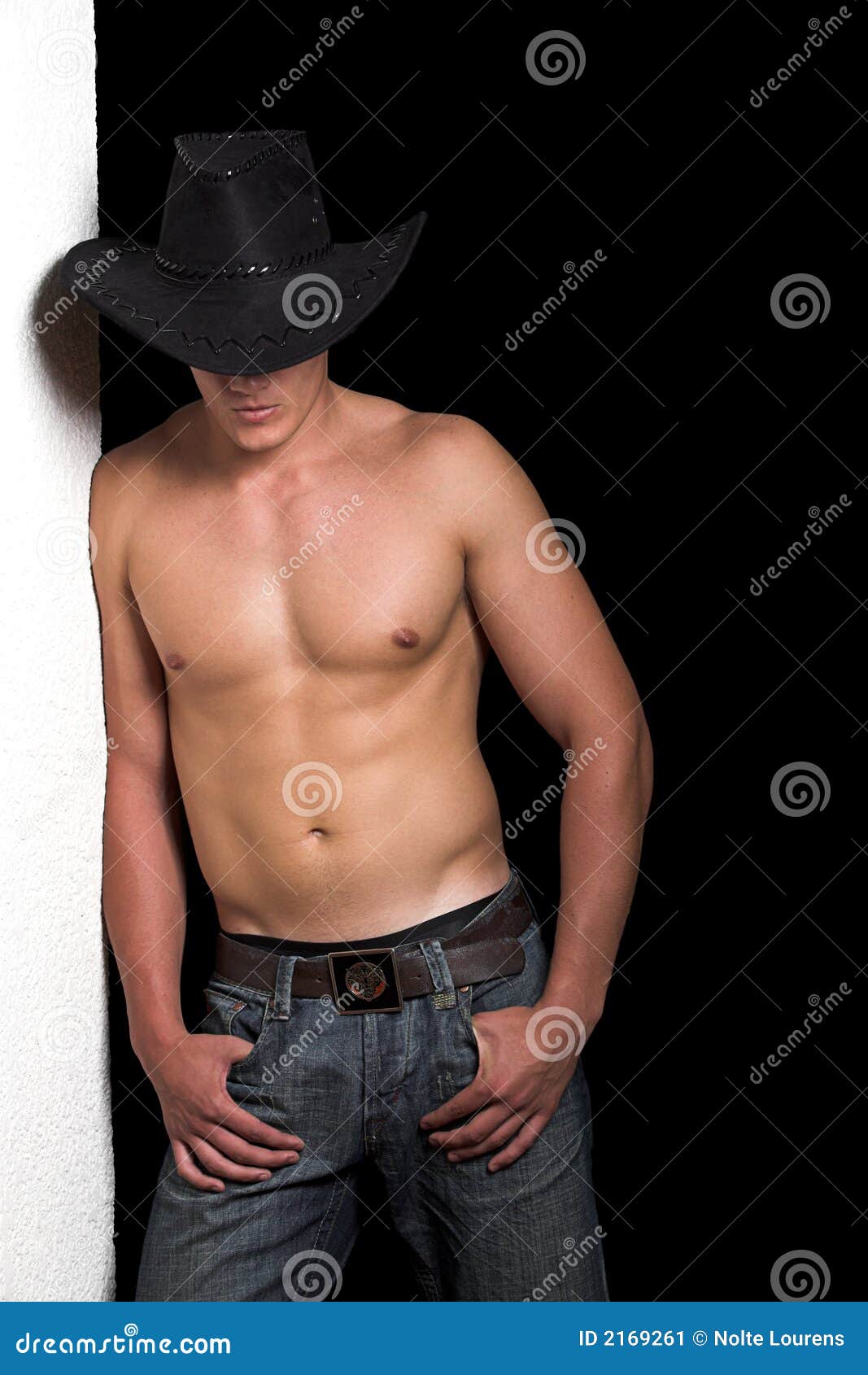 Cowboy Leaning On Barn And Smirking Royalty-Free Stock Photography ...