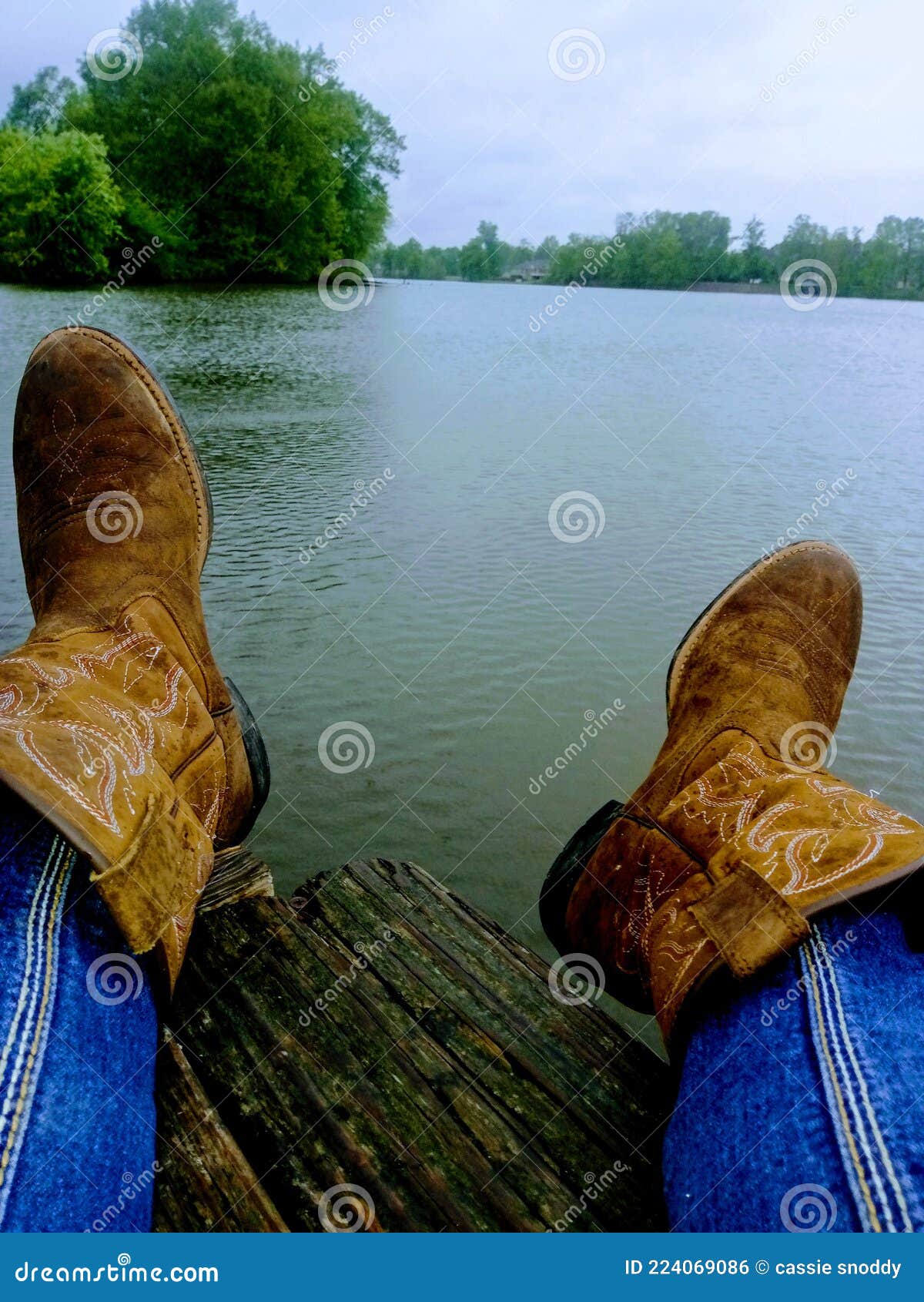 Cowboy Boots Fishing by the Water Stock Photo - Image of water, vehicle ...