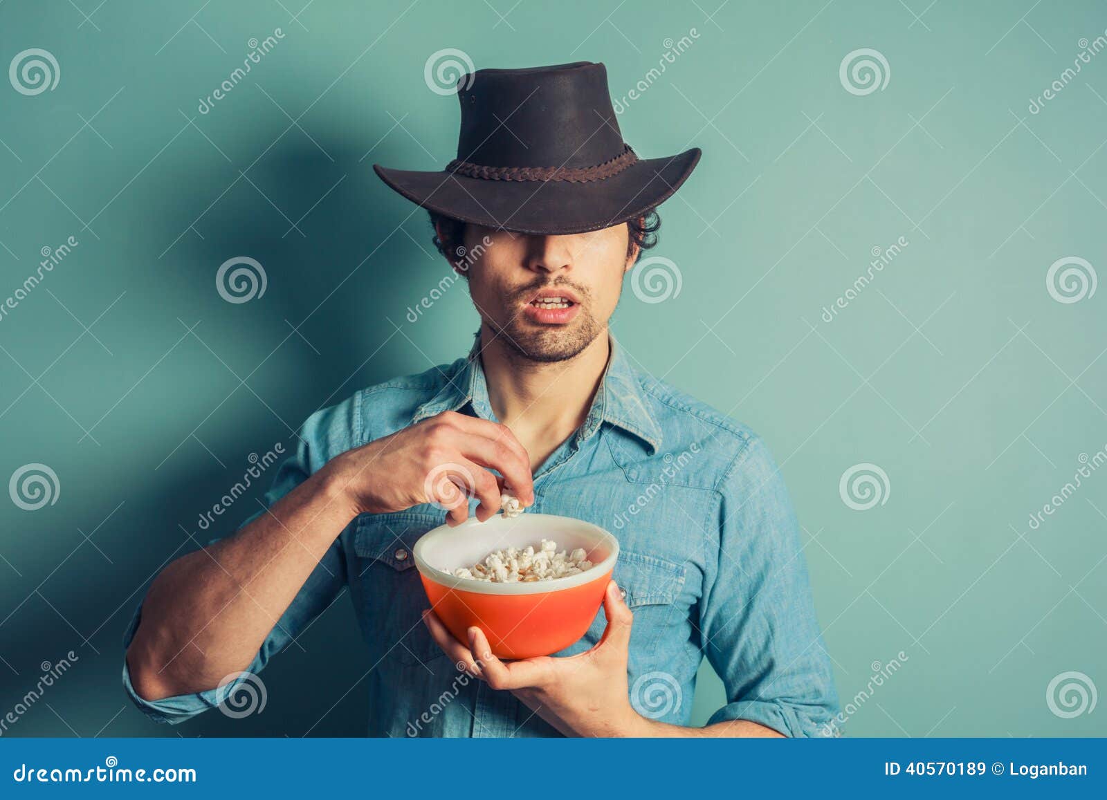 Cowboy Eating Popcorn Stock Photos - Free & Royalty-Free Stock Photos ...