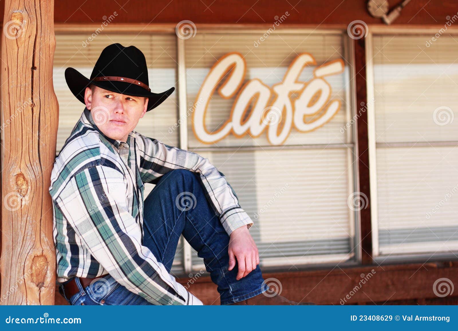 Cowboy in Front of Cafe stock image. Image of blue, attractive - 23408629