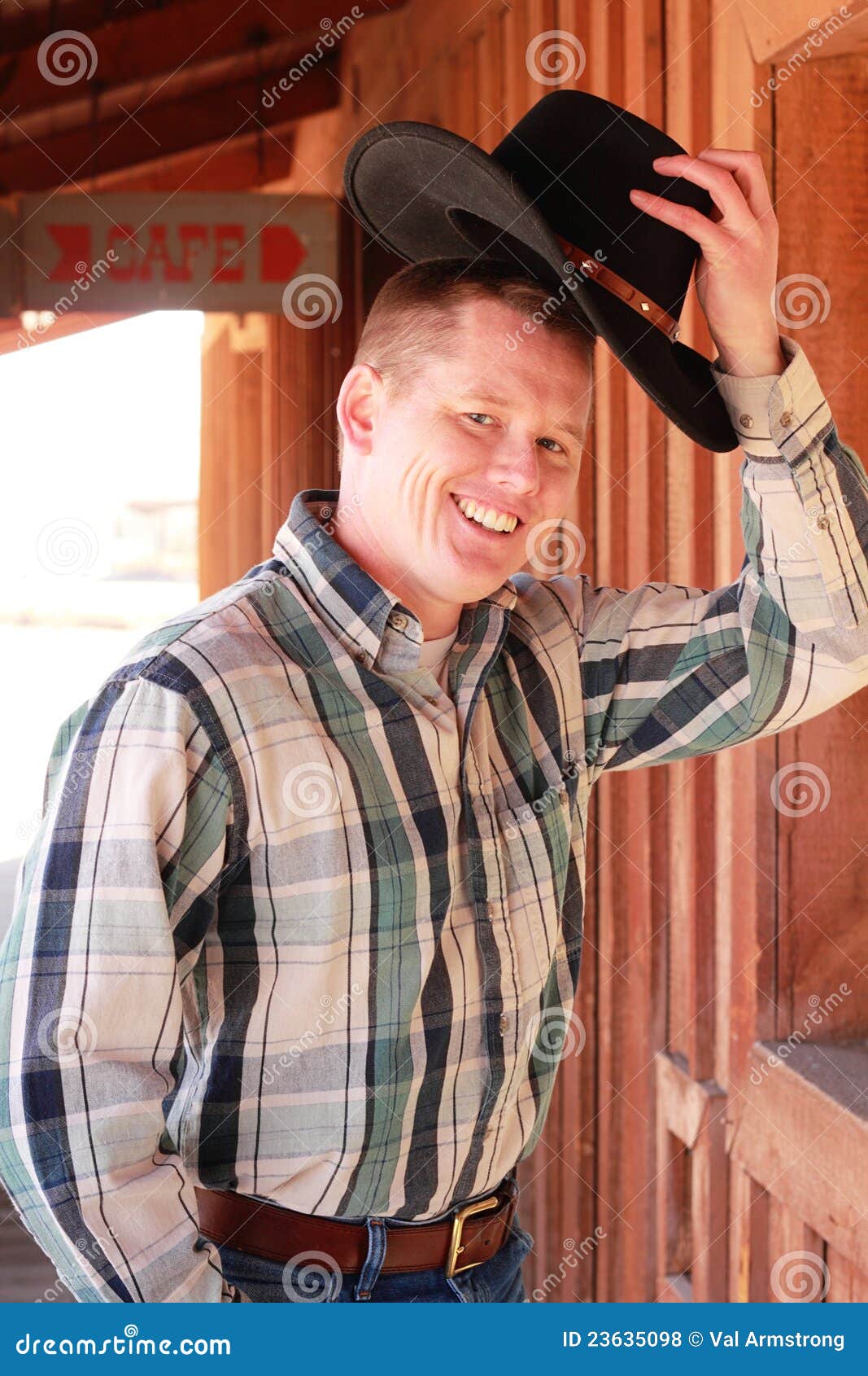 Cowboy Greeting - Raise of the Cowboy Hat Stock Photo - Image of good ...