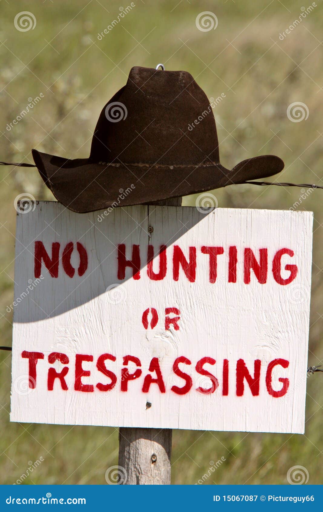 Cowboy Hat Over Posted Sign Stock Image - Image of rural, scene: 15067087